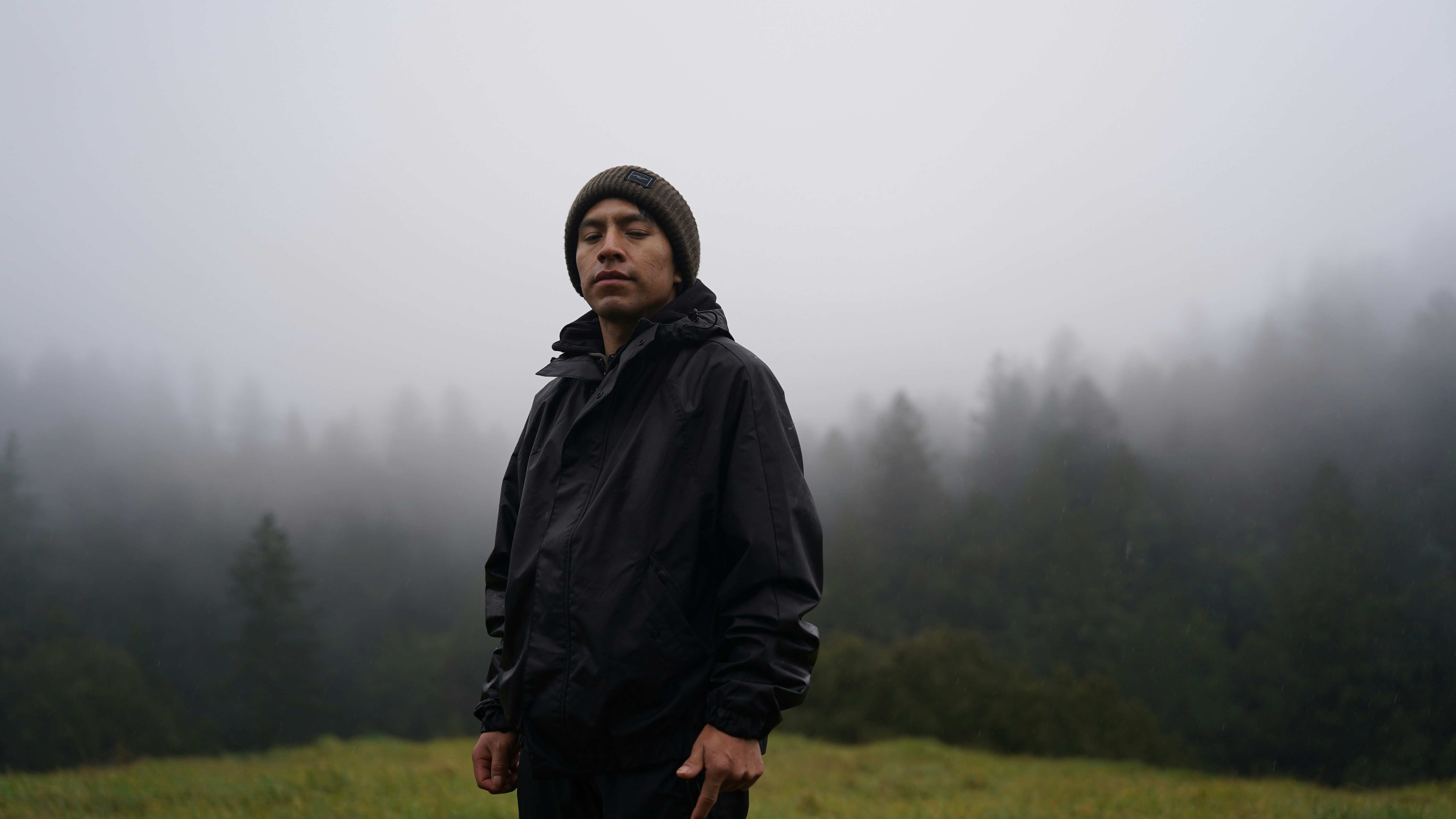 Mist and Manners: A solitary figure amid foggy hillside