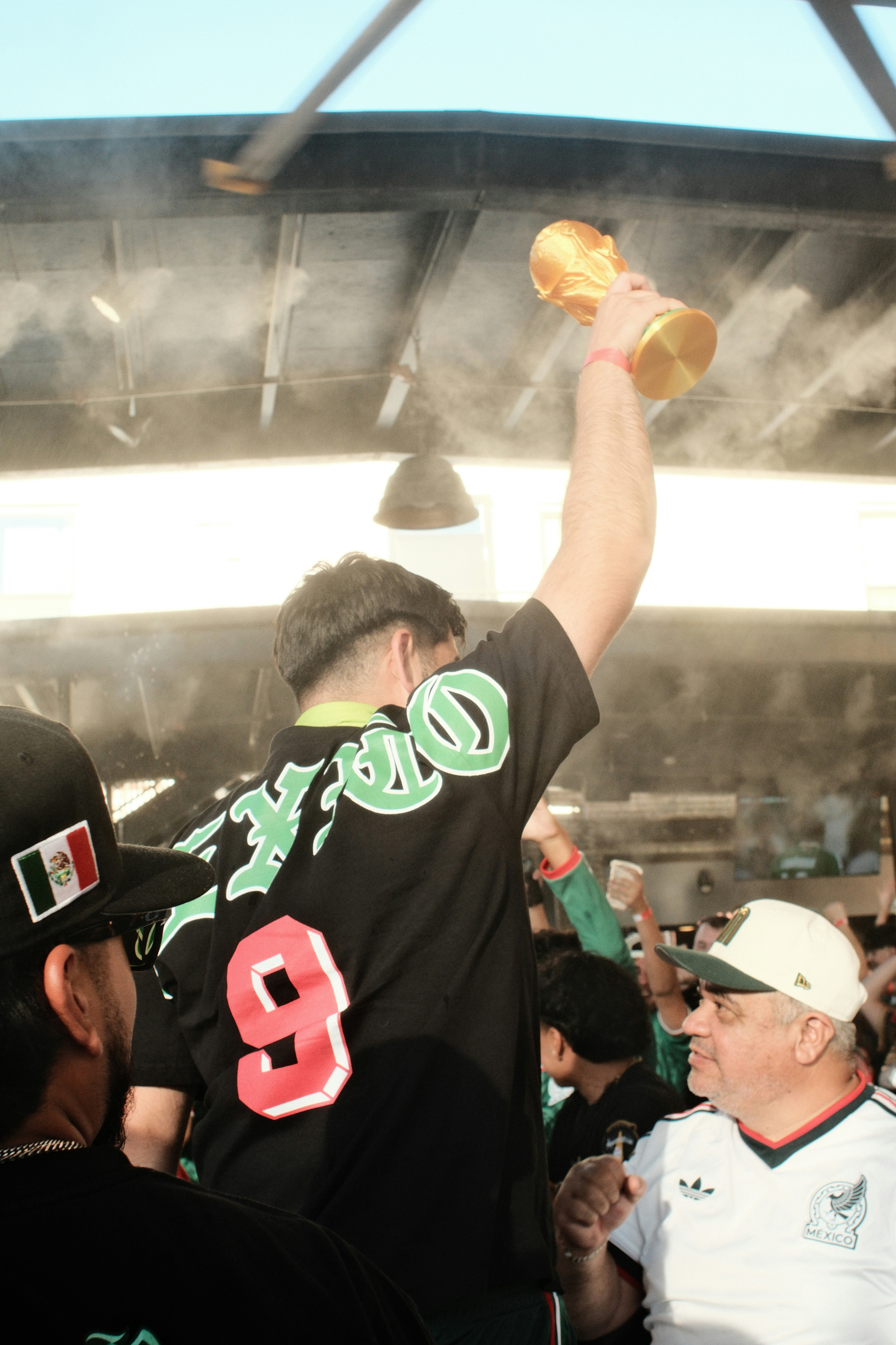 High-spirits Relay: Throwing the Cup in a Lively Stadium Moment
