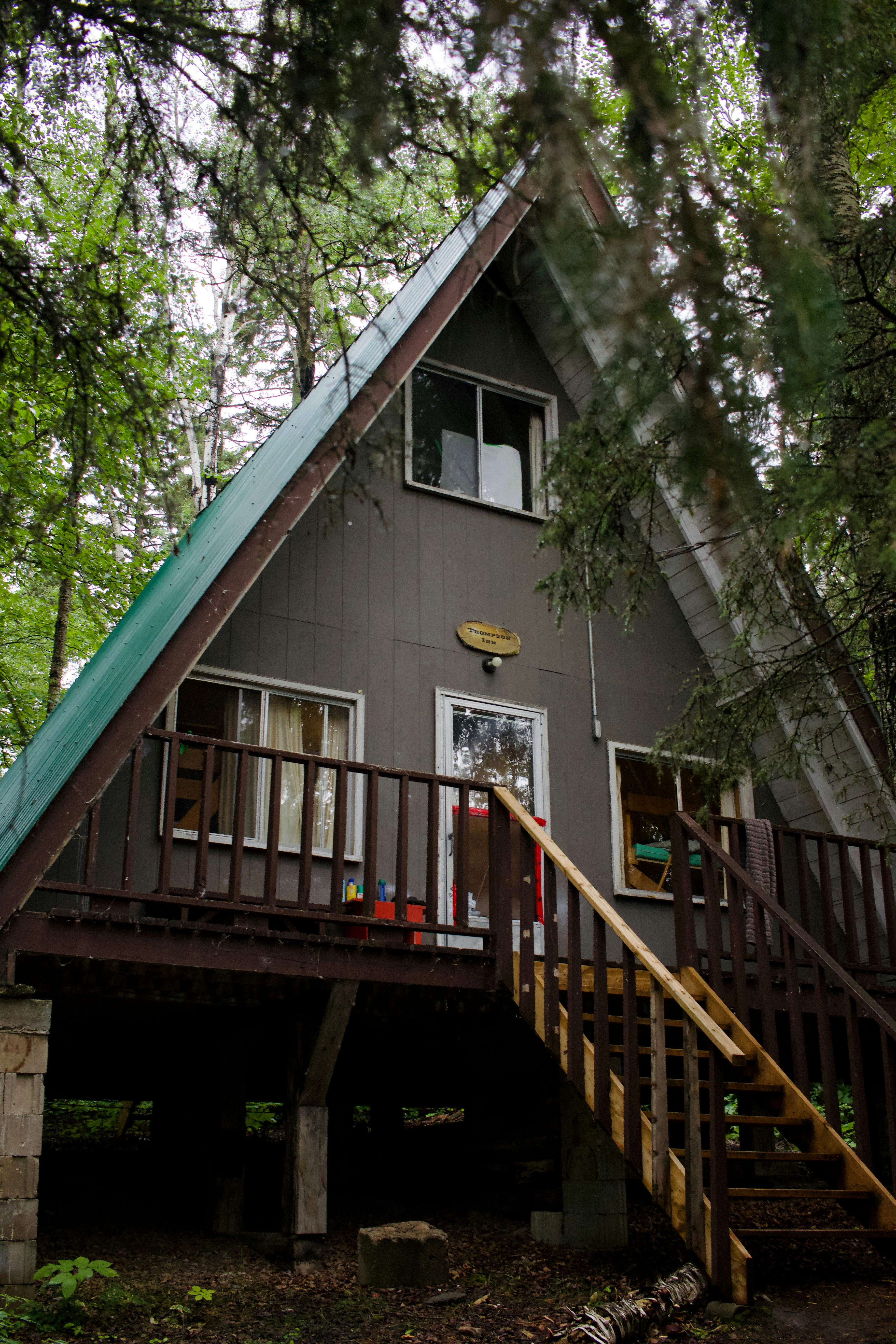 A-Frame Retreat: Sunlit Cabin Amid Tall Pines