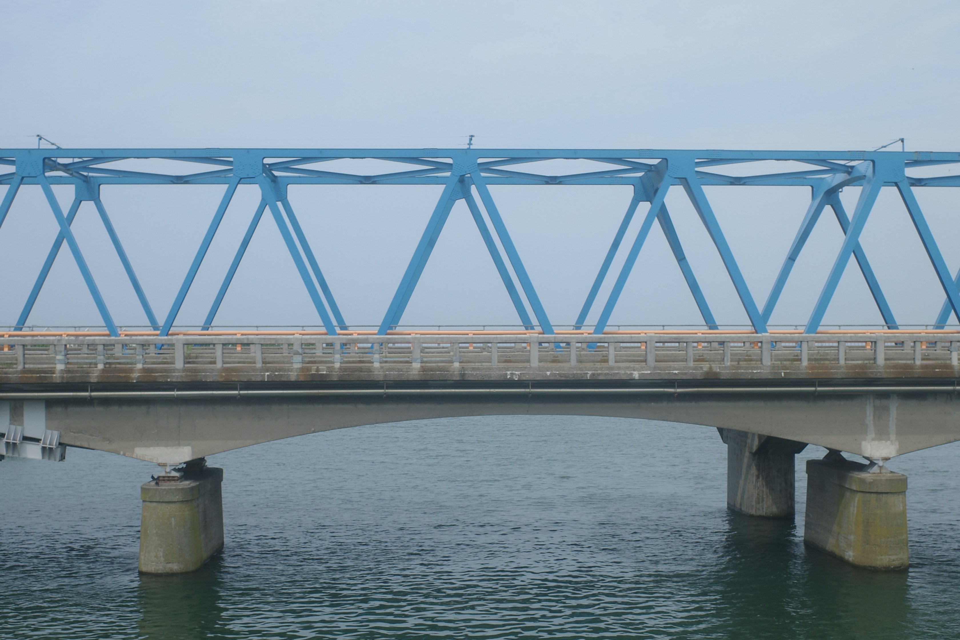 Blue Truss Across Quiet Water