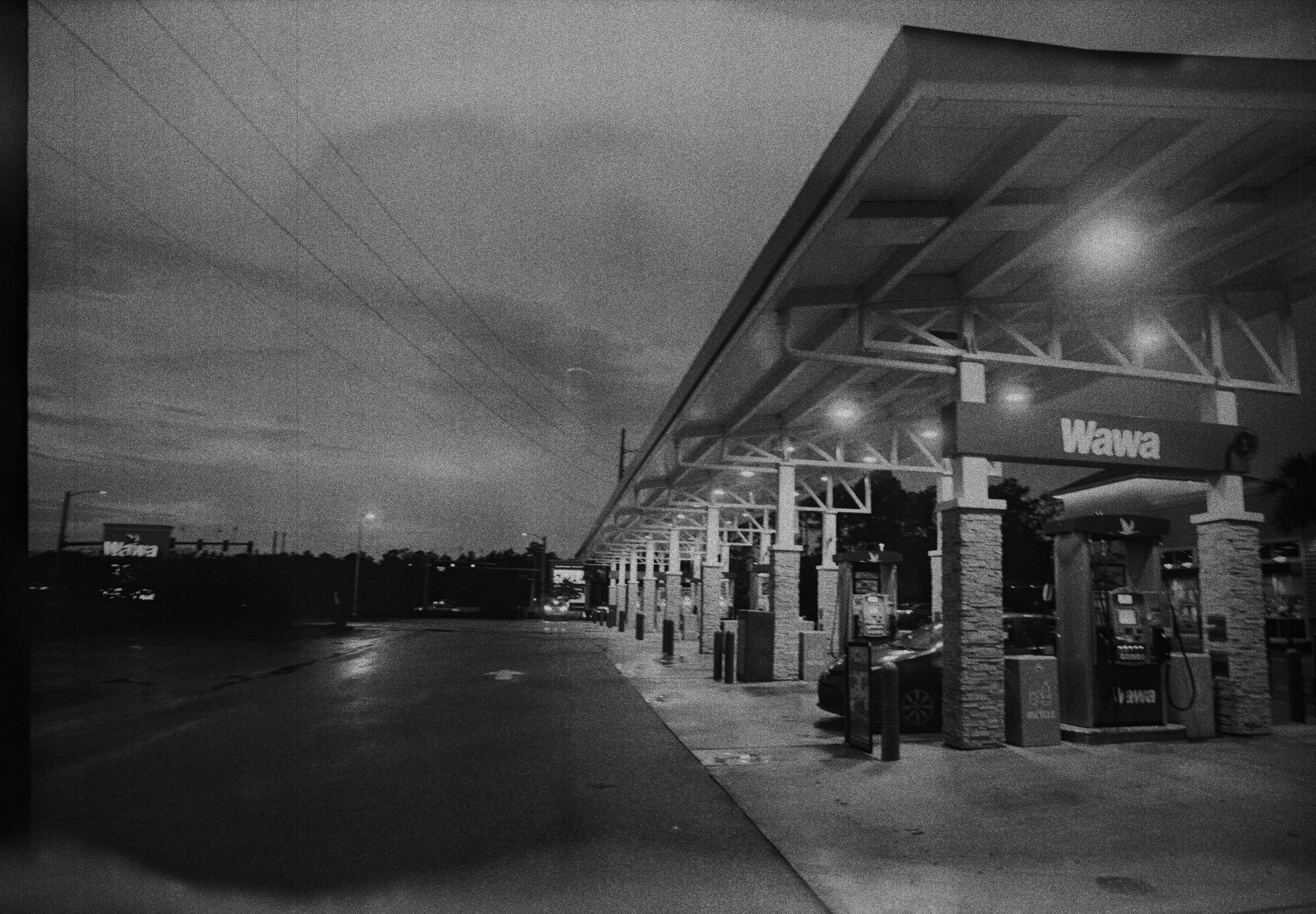 Gas Station Glow: Evening Canopy and Quiet Forecourt