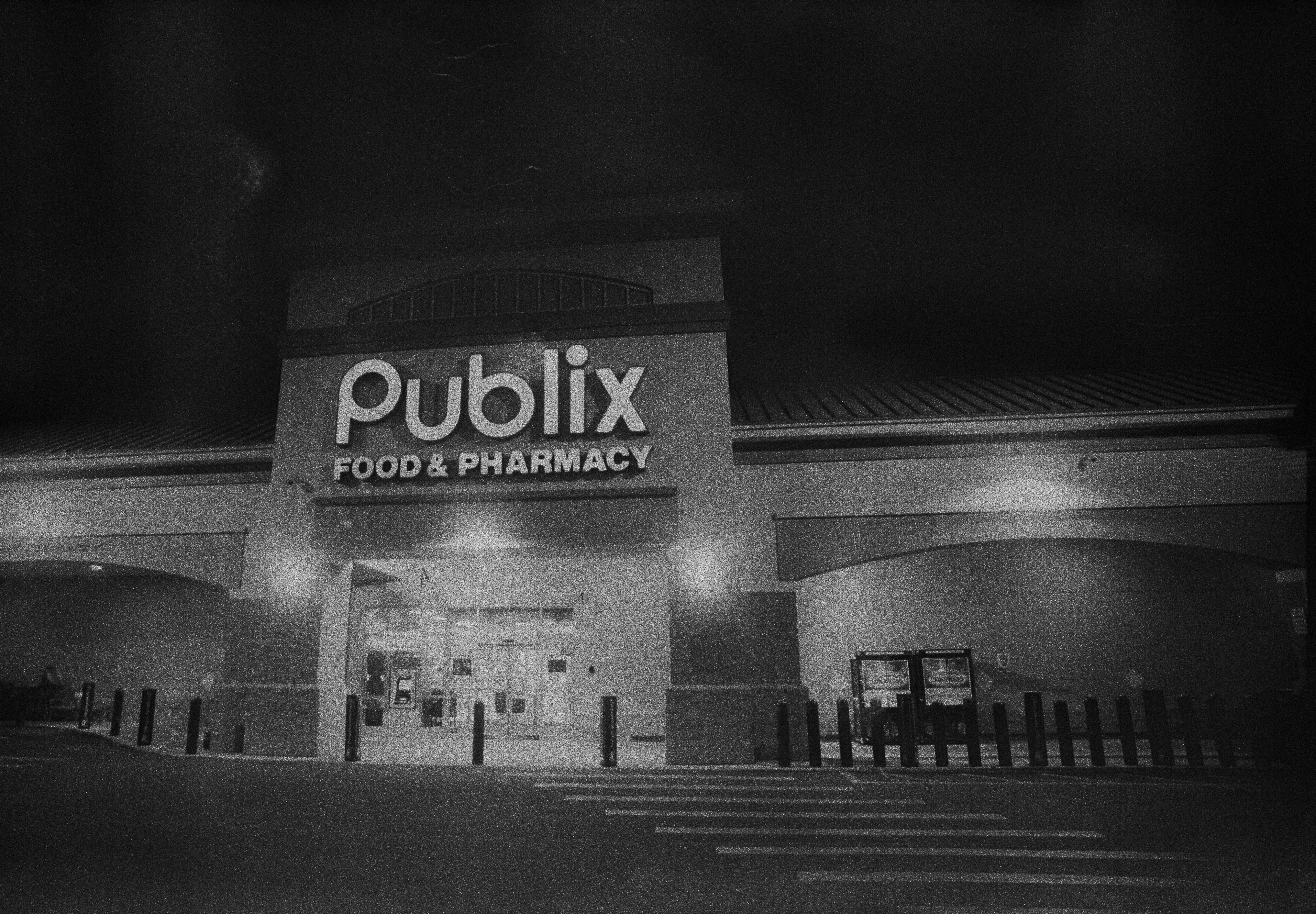 Soft-Glow Night at the Publix: A Quiet Silhouette of the Storefront
