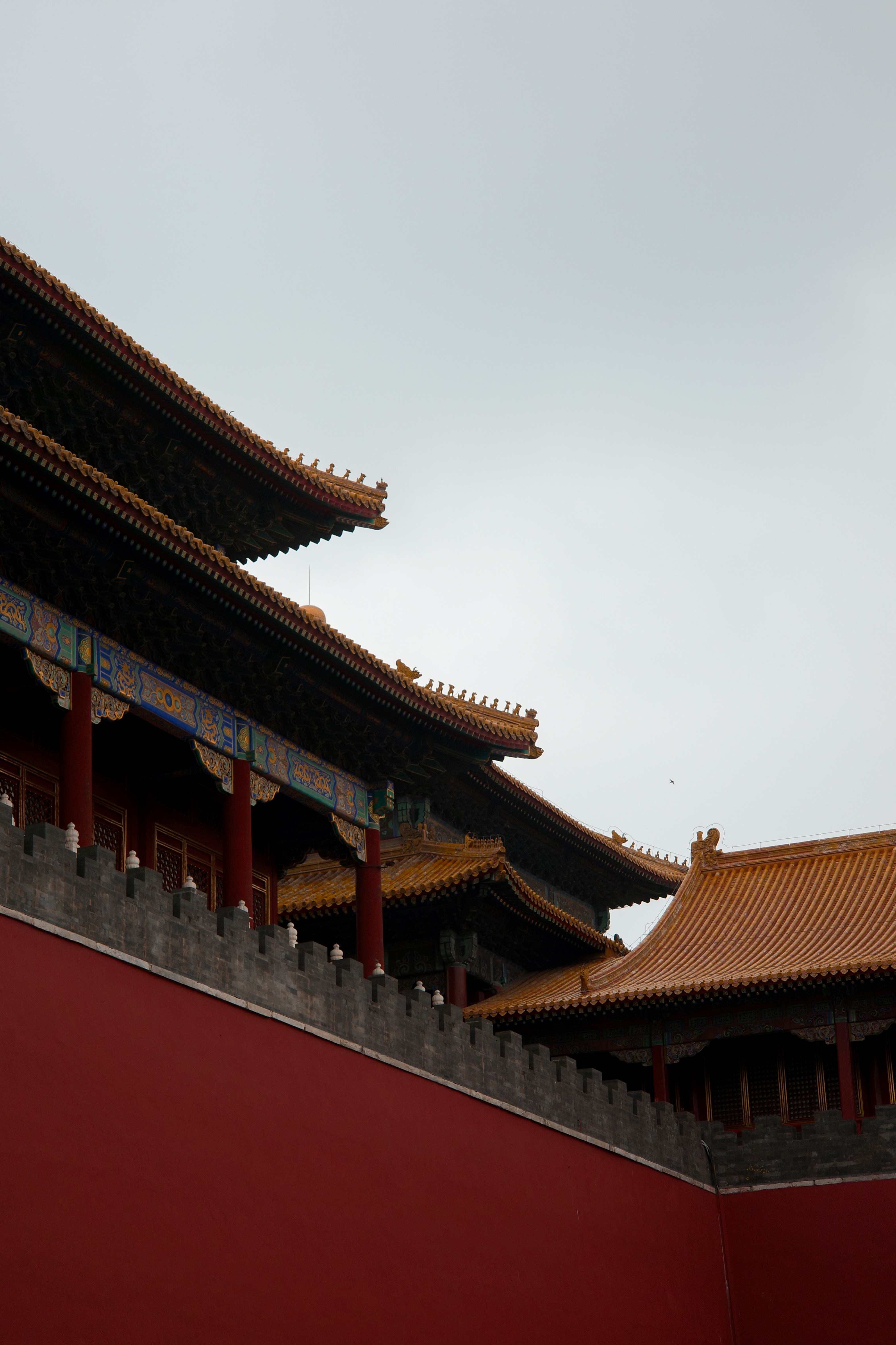 Temple Rooflines Along a Red Wall