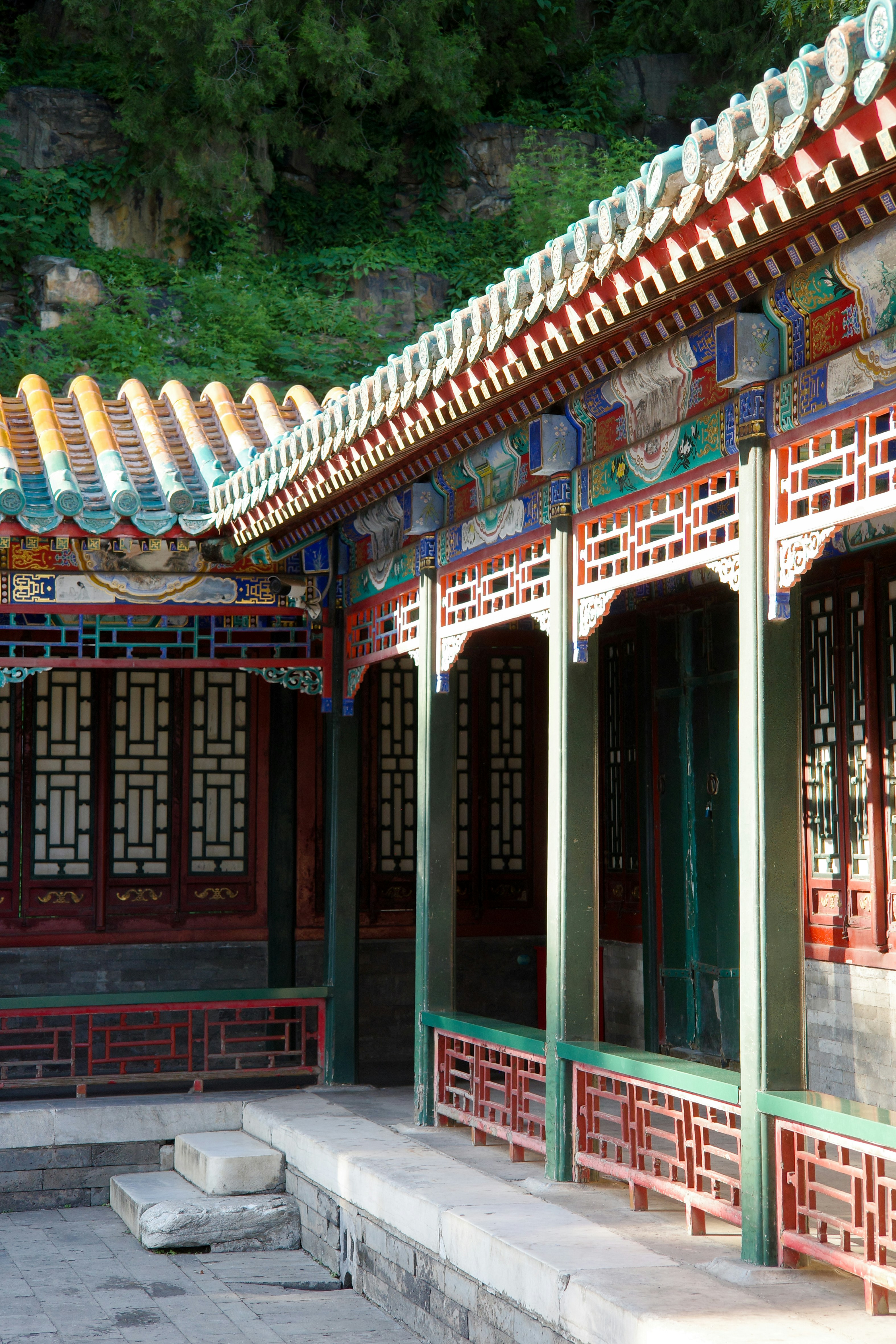 Colorful Corridor of a Chinese Pavilion with Intricate Latticework