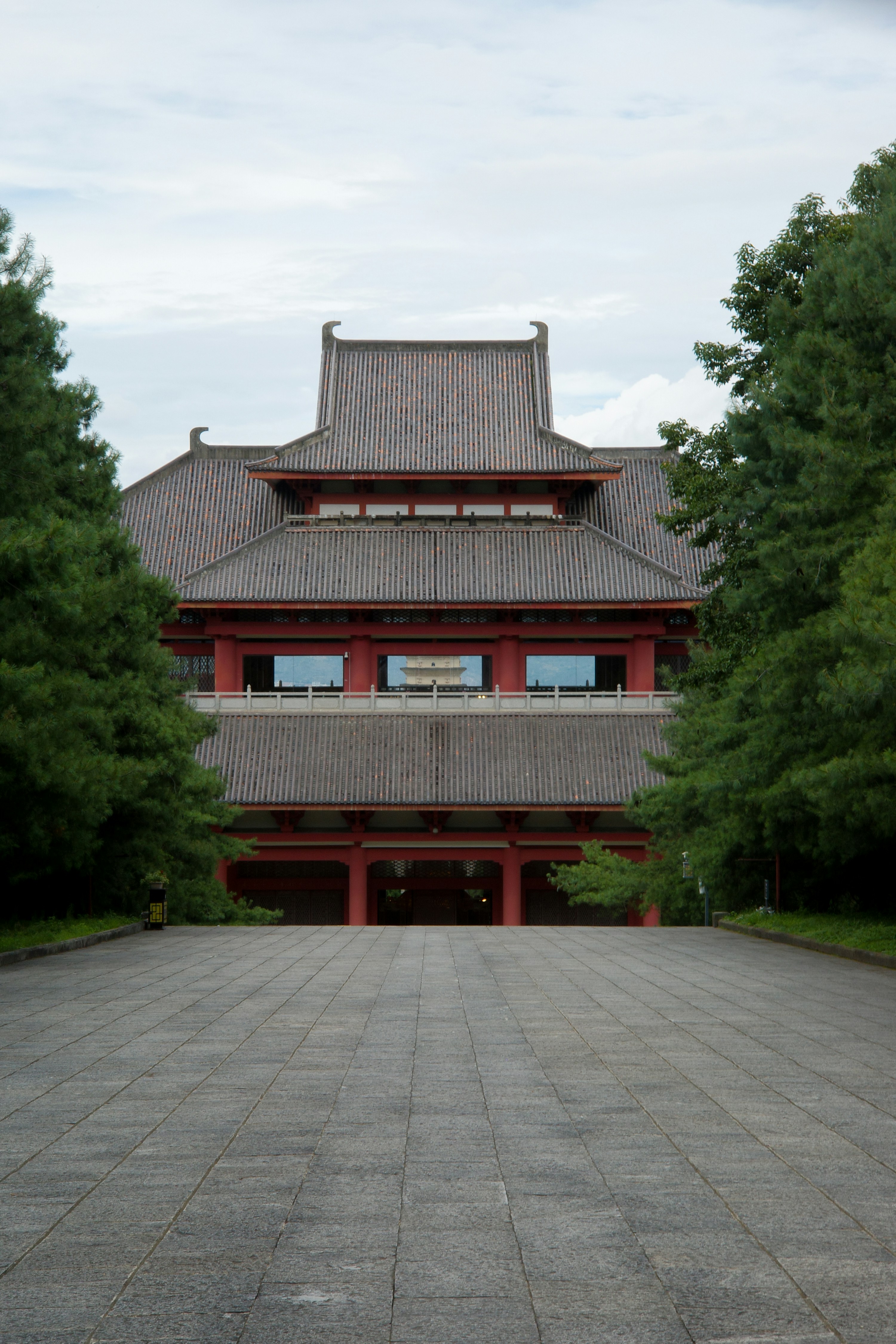 Red Pagoda Gate Framed by Weeping Green
