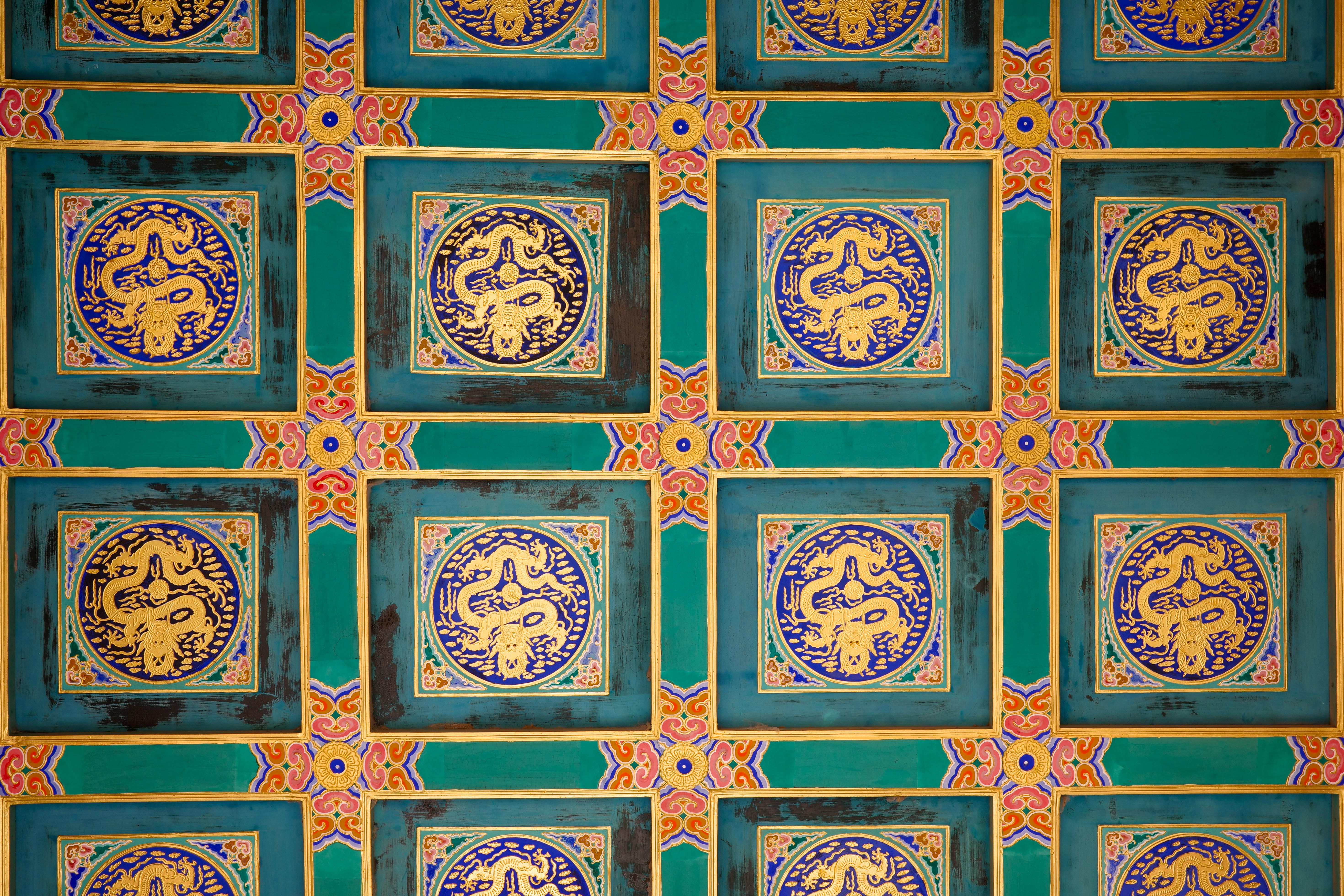 Ornate Tile Mosaic: Repeating Circles of Gold and Teal