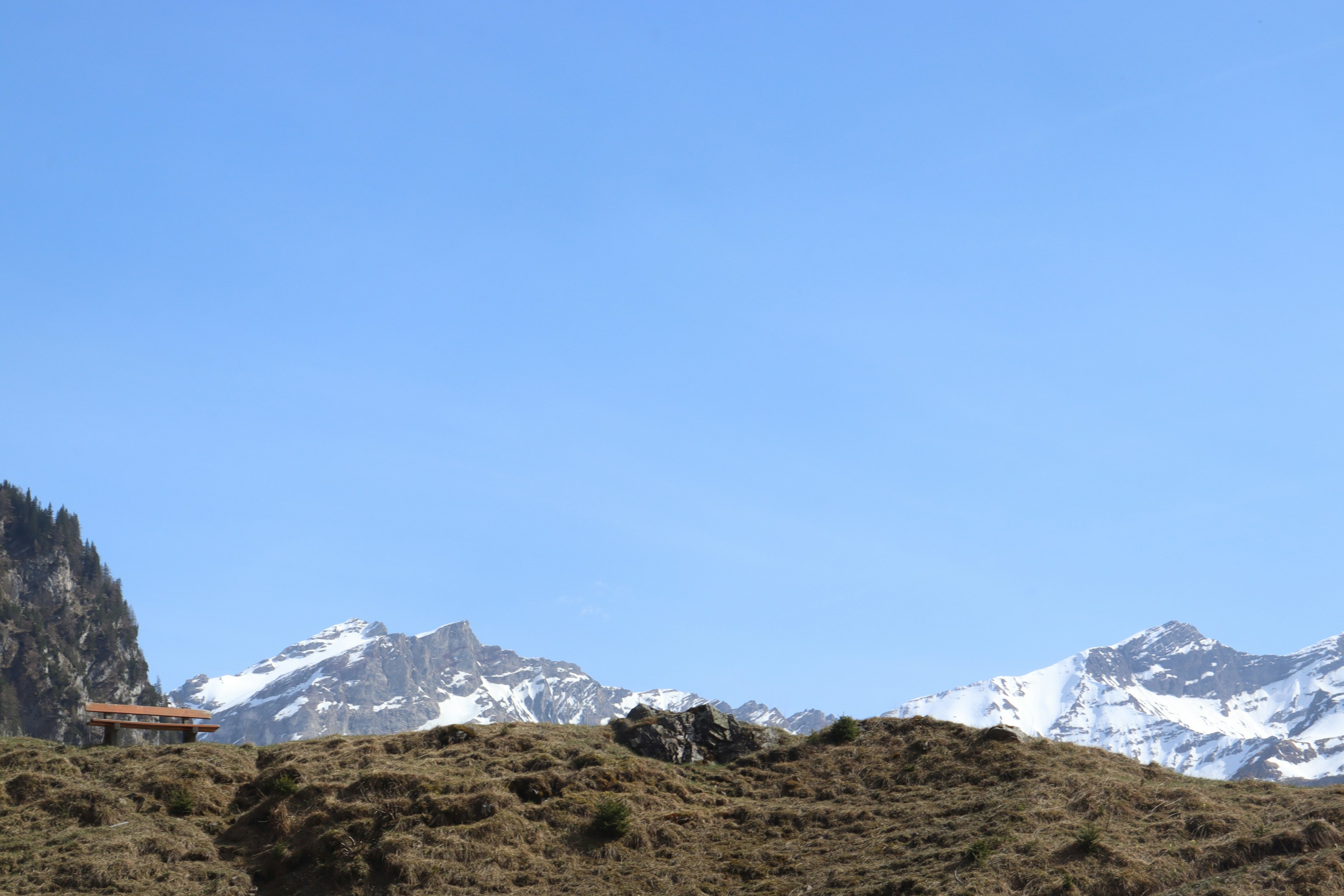 Horizon Bench Under a Clear Alpine Sky
