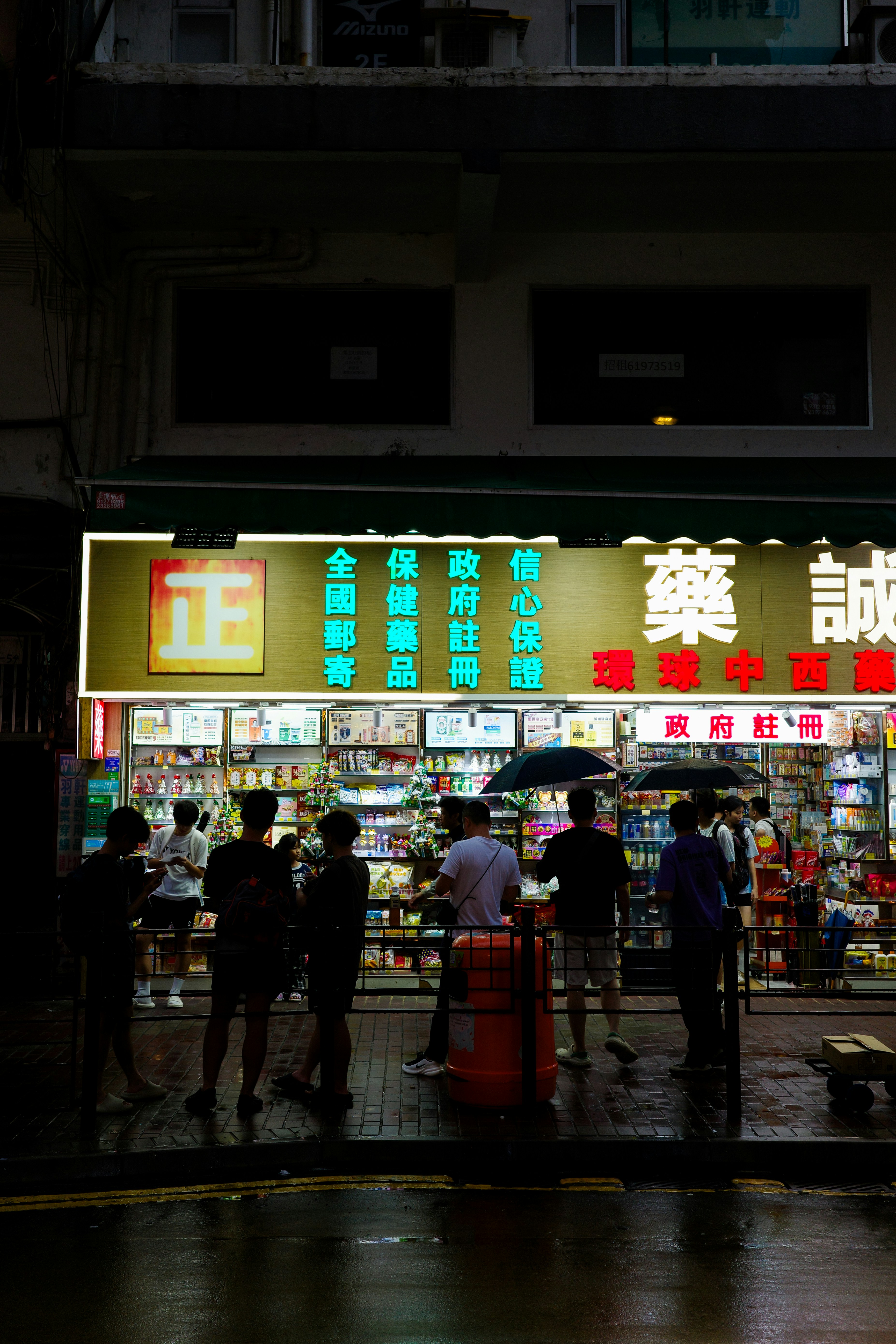 Neon Orchard: Night Market Glow Over a Bustling Facade