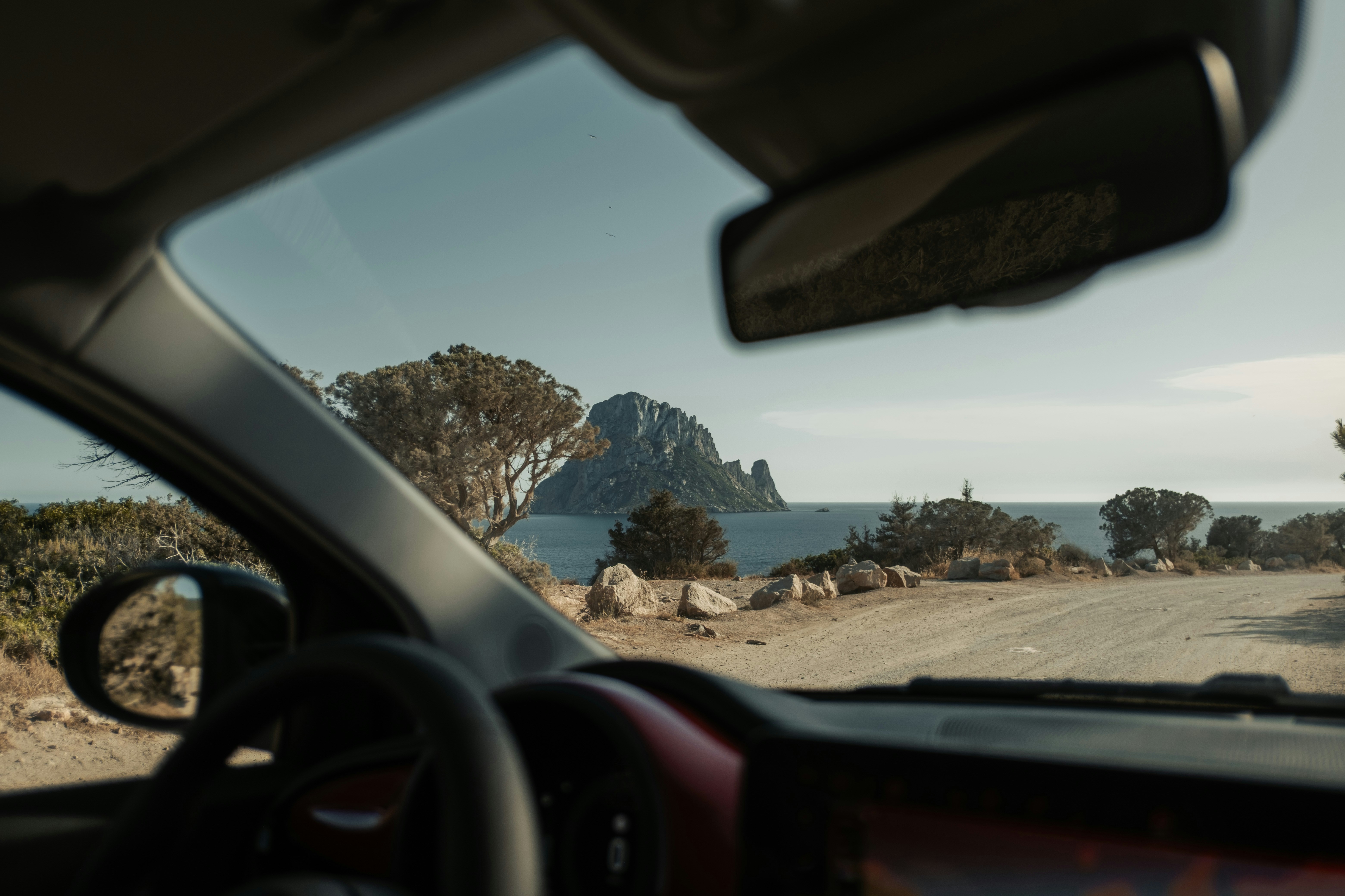 Coastal Road Shortcut: Sunset View Through the Car Window