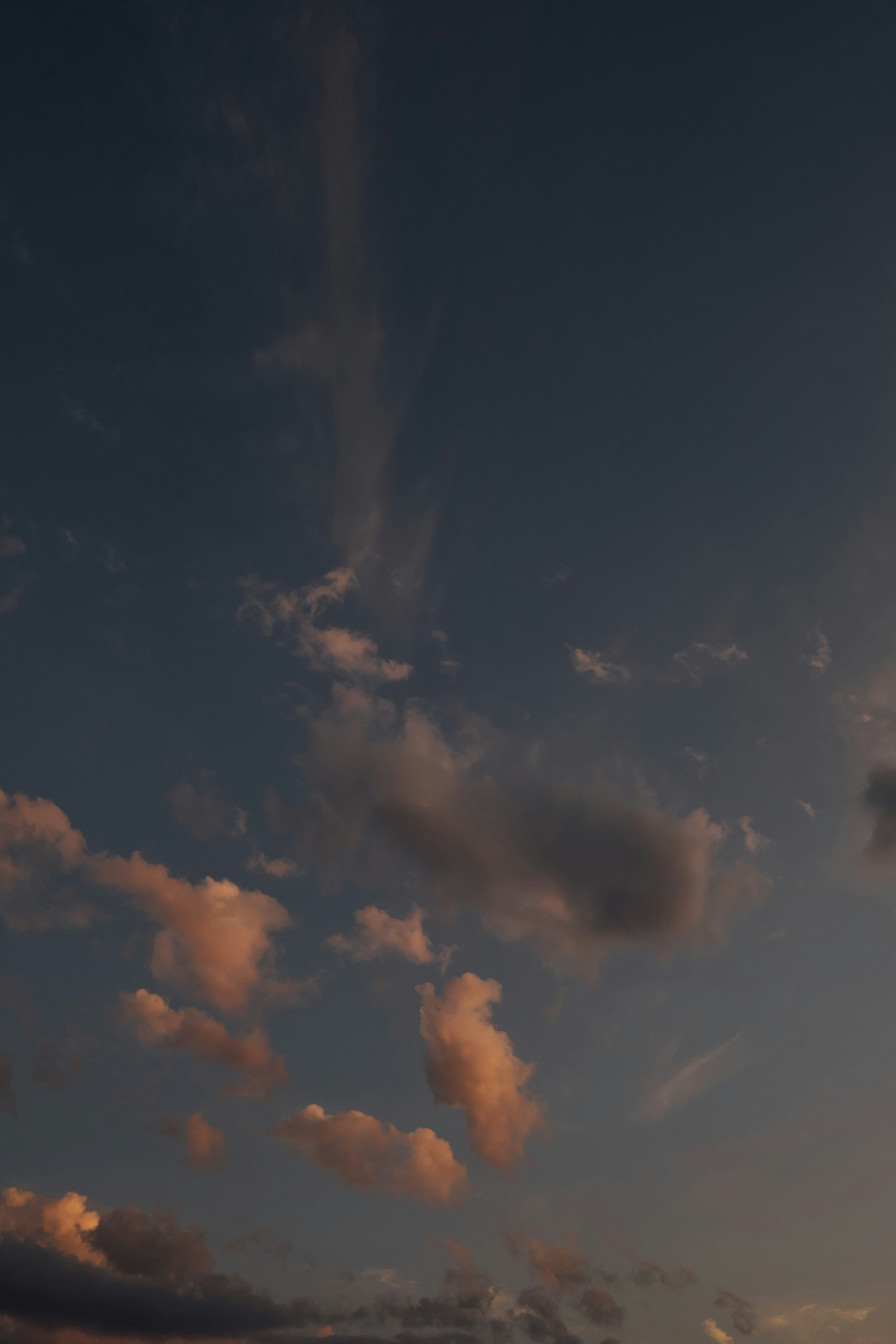 Sunset Skies: Floating Clouds in Quiet D Light