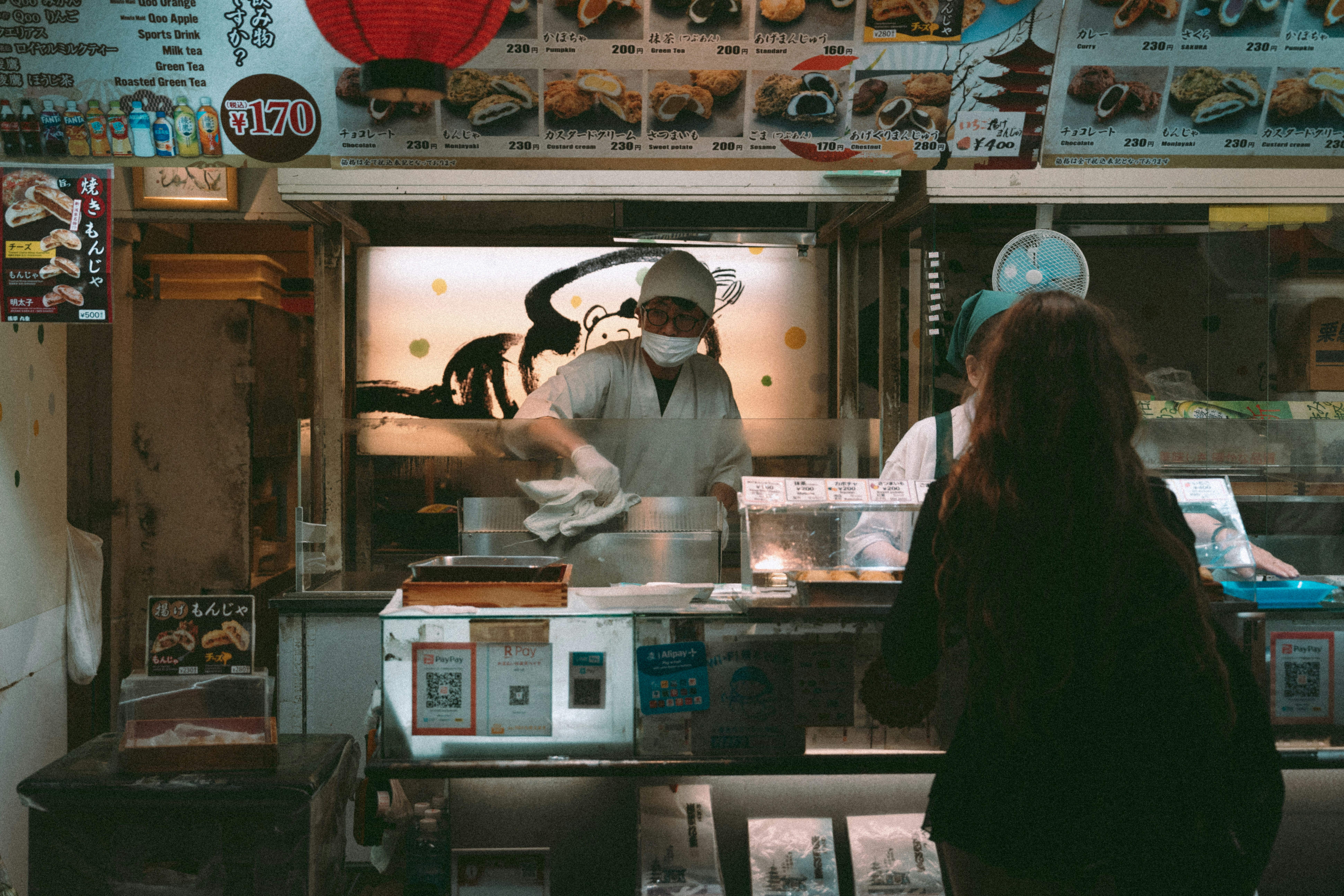Midnight Market Clerk: A Quiet Exchange Under Neon Glow