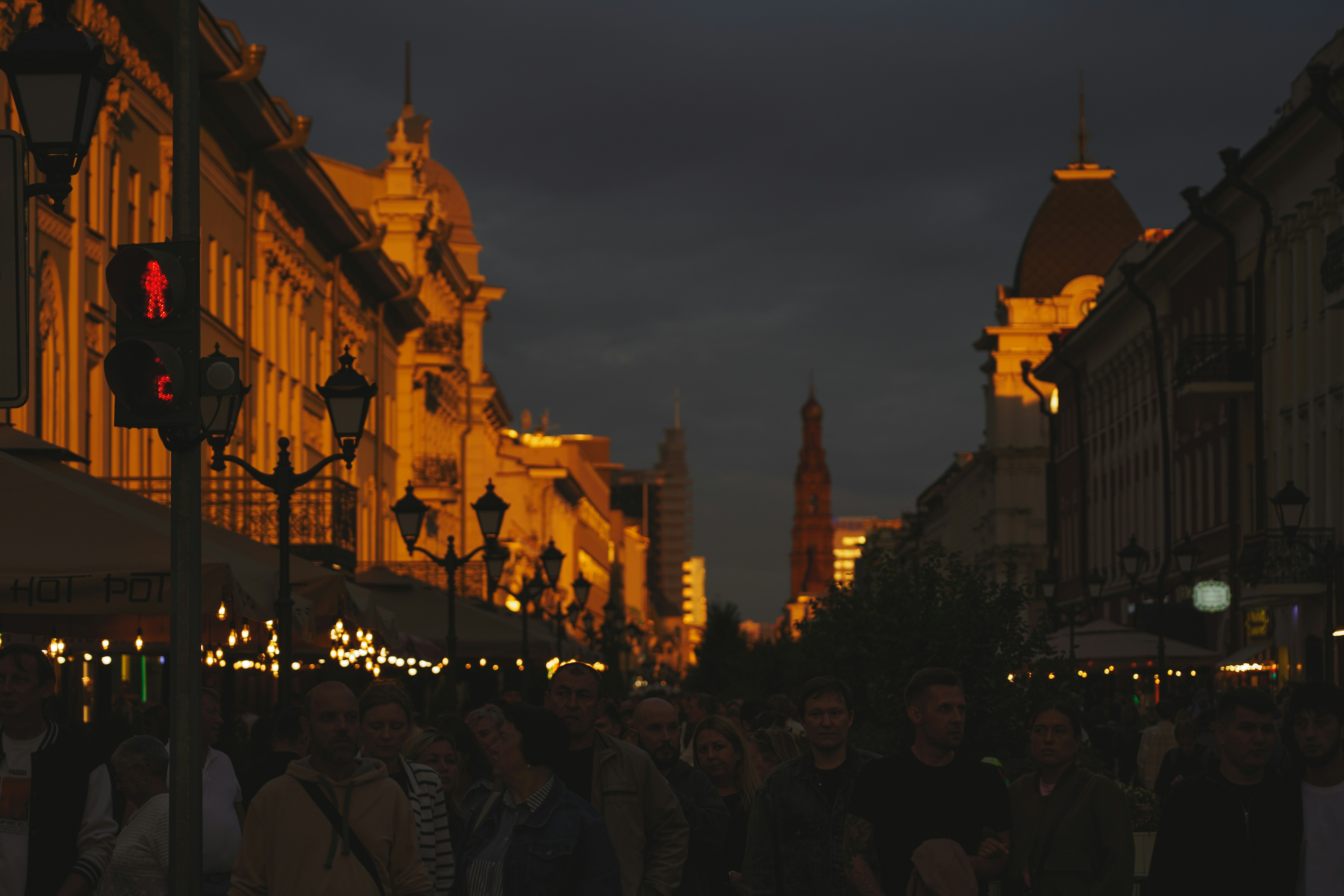Golden Hour Through a Bustling Urban Avenue