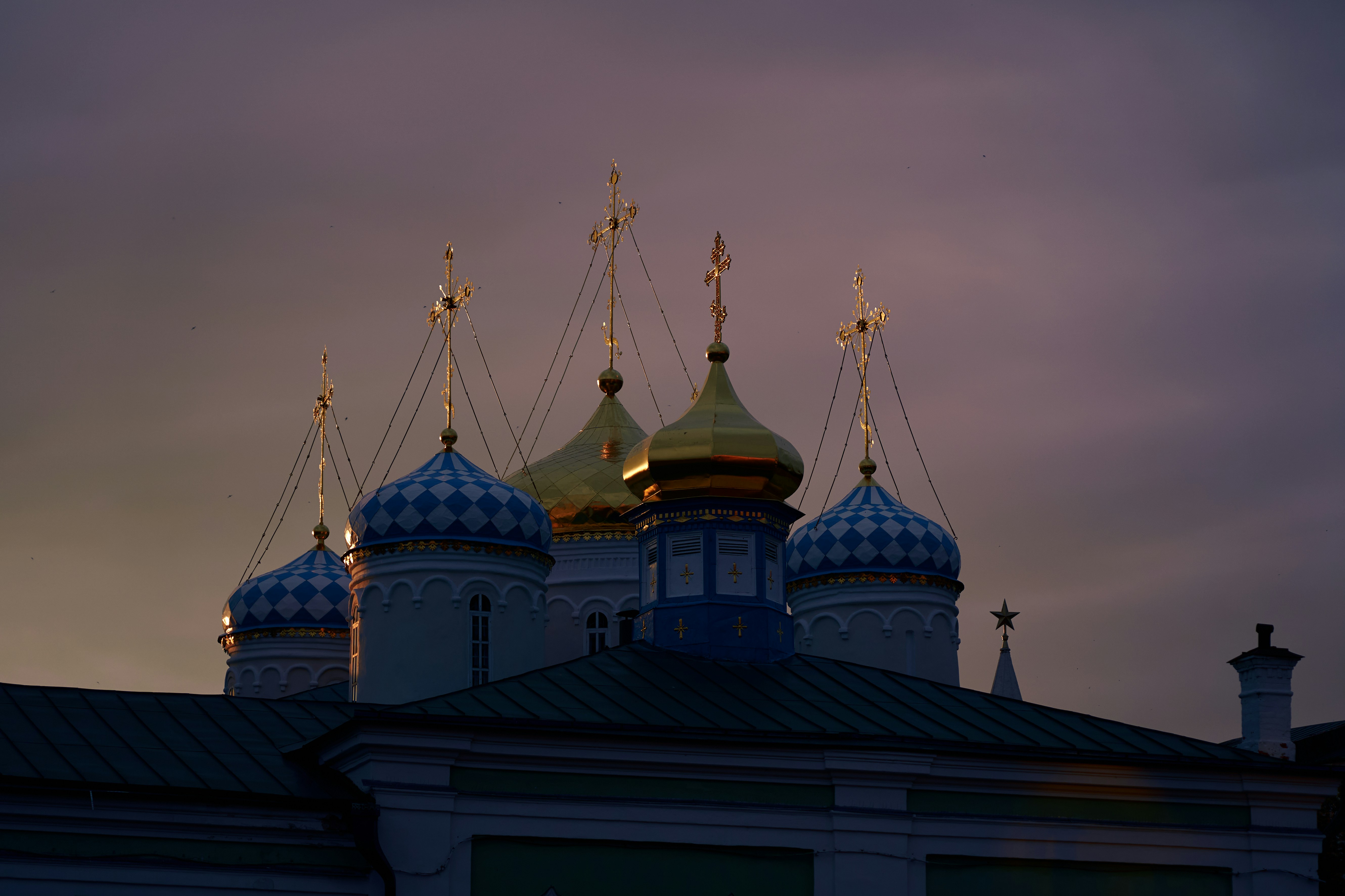 Golden Spires at Dusk Over a Quiet Rooftop