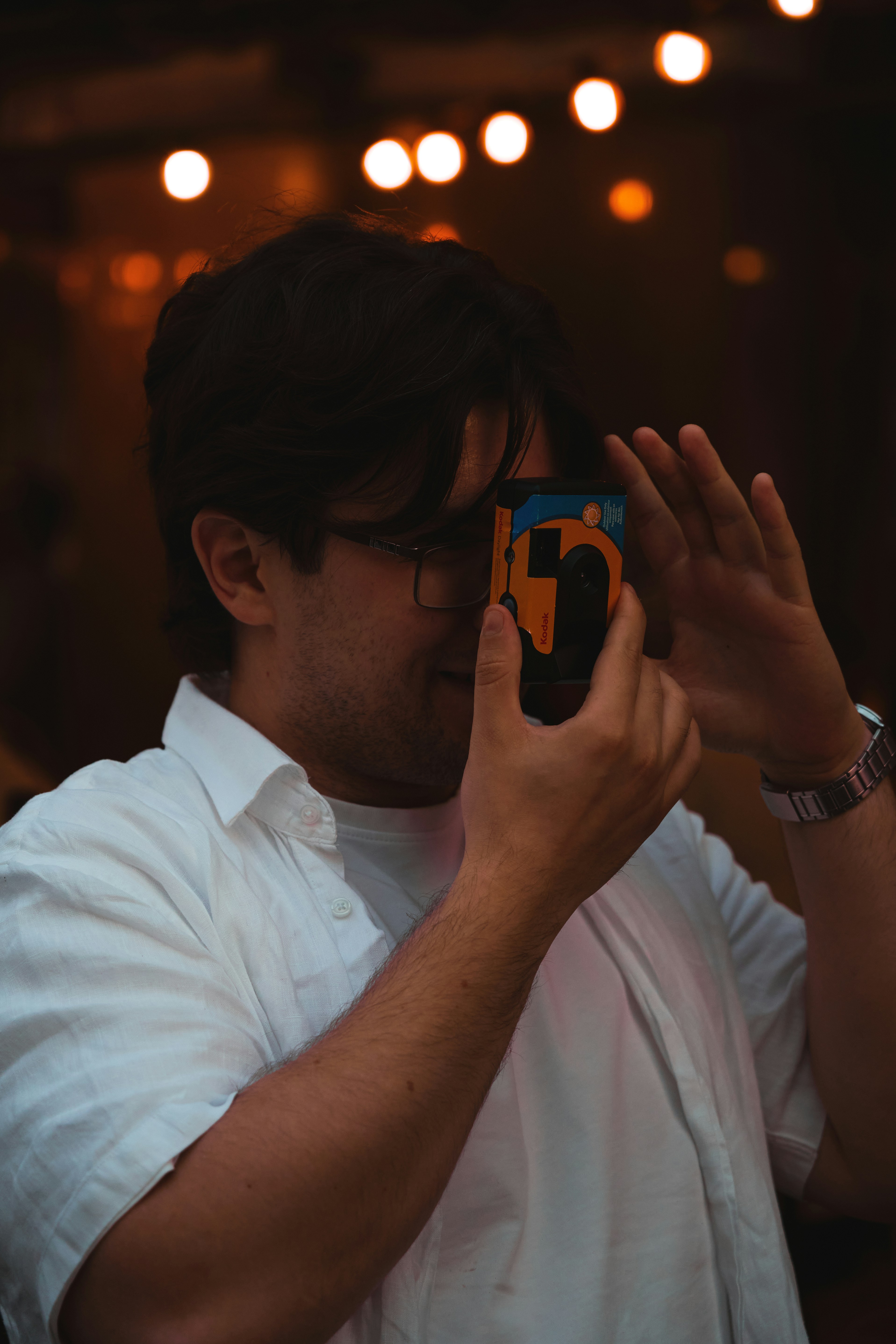 In Focus in the Soft Glow: A Portrait of Artful Concentration