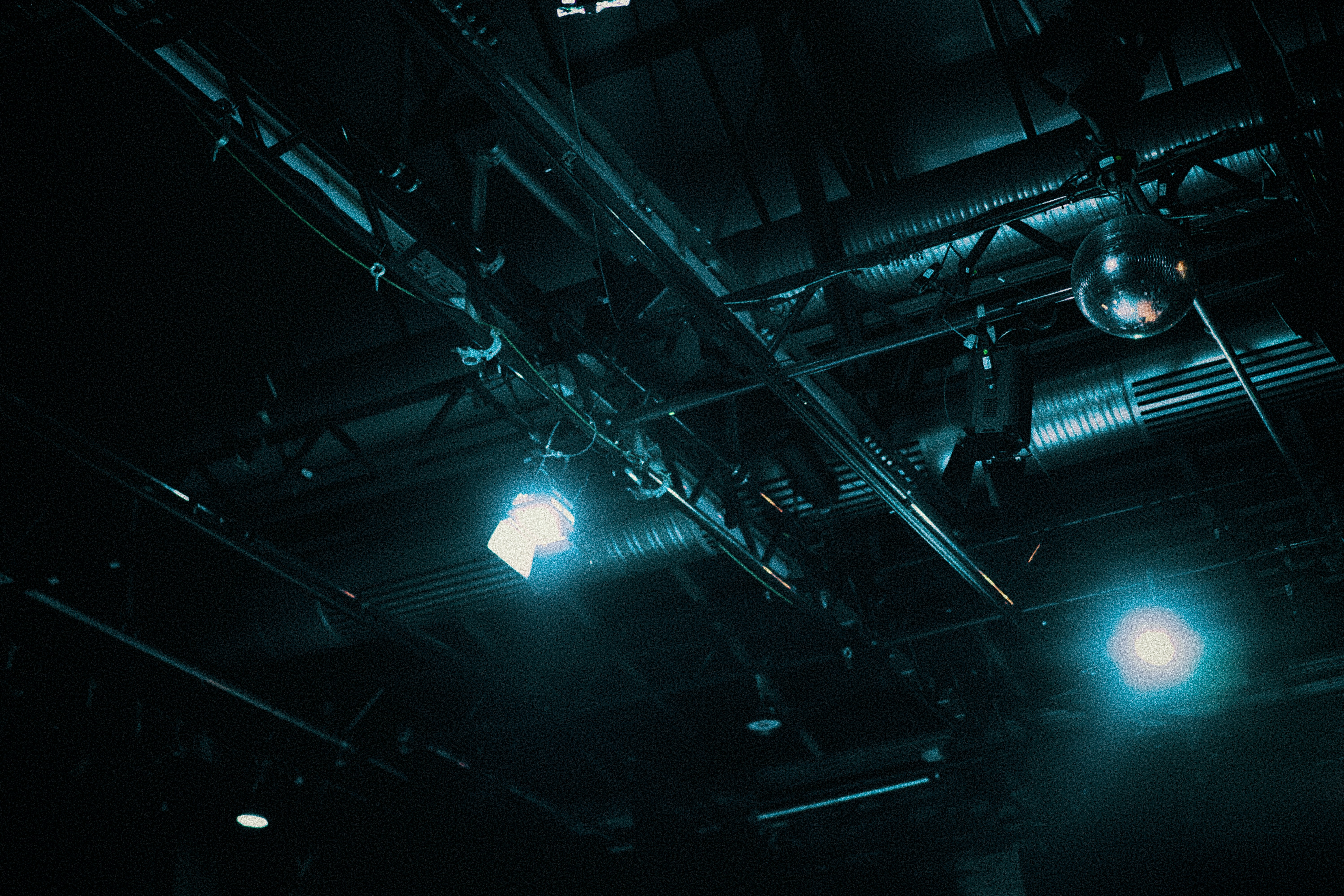 Blue Neon Illumination in a Quiet Studio Ceiling