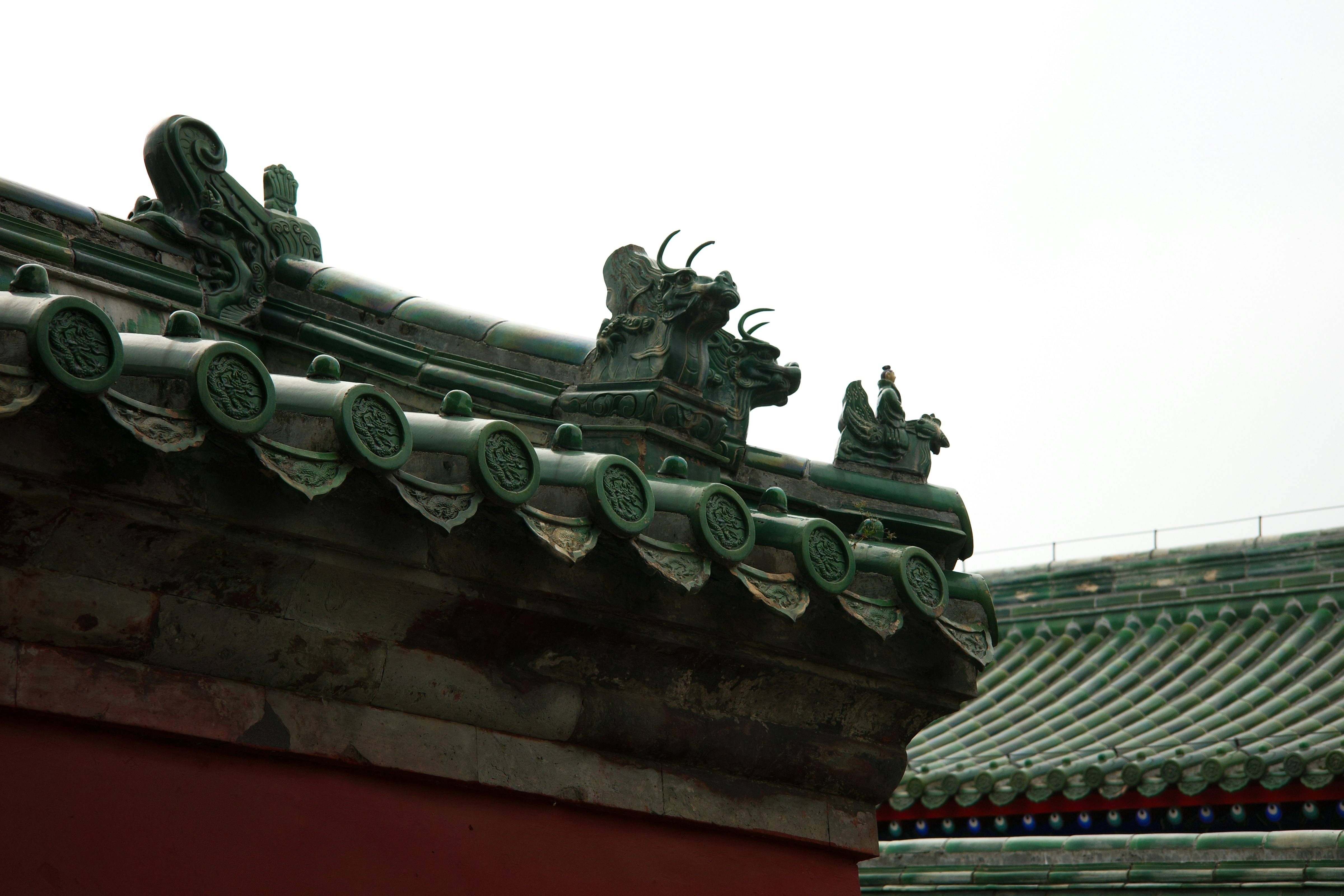 Dragon-roof Guardians Overlook a Quiet Courtyard