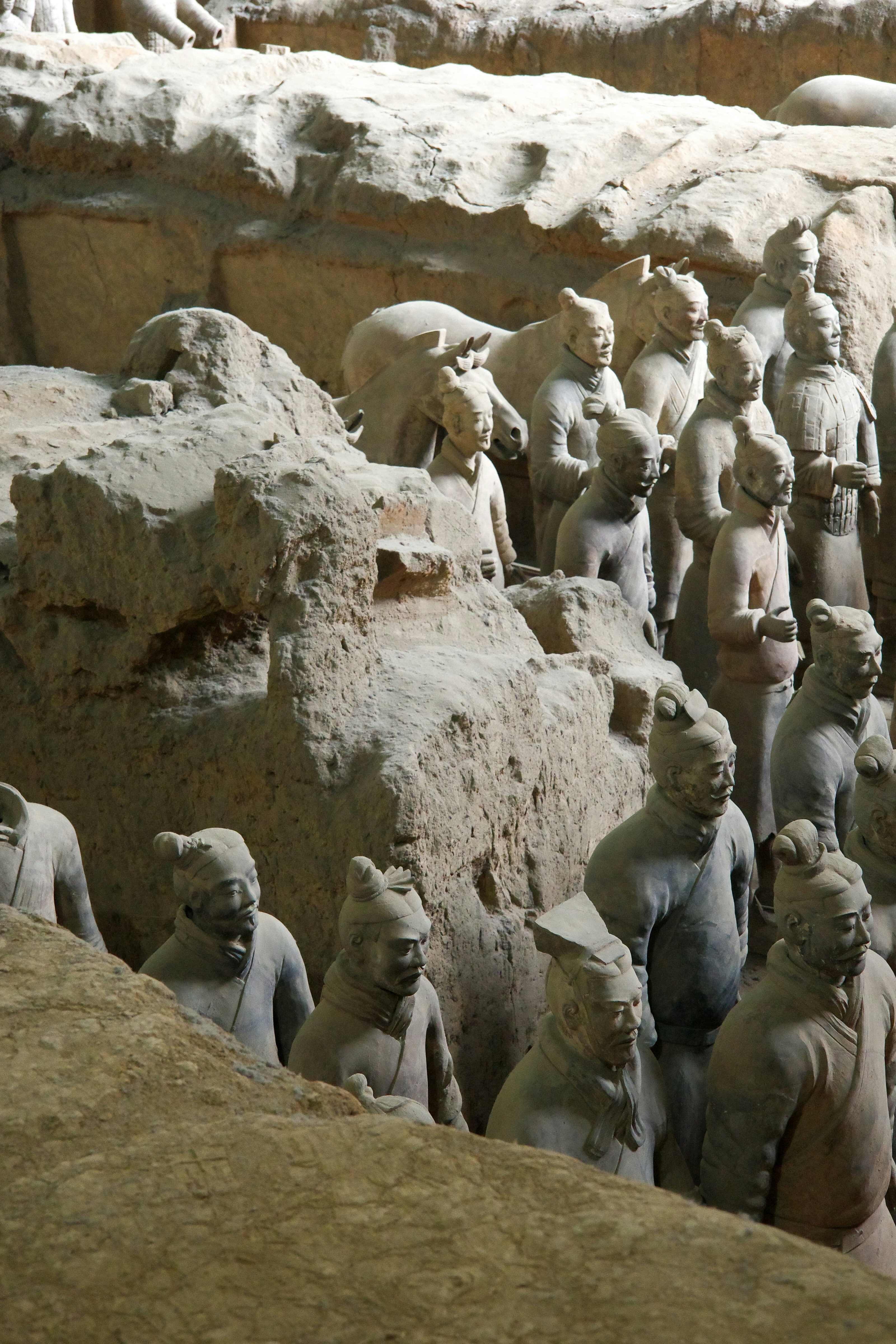 Council of Stone: Terracotta Figures Emerges from the Earthen Wall