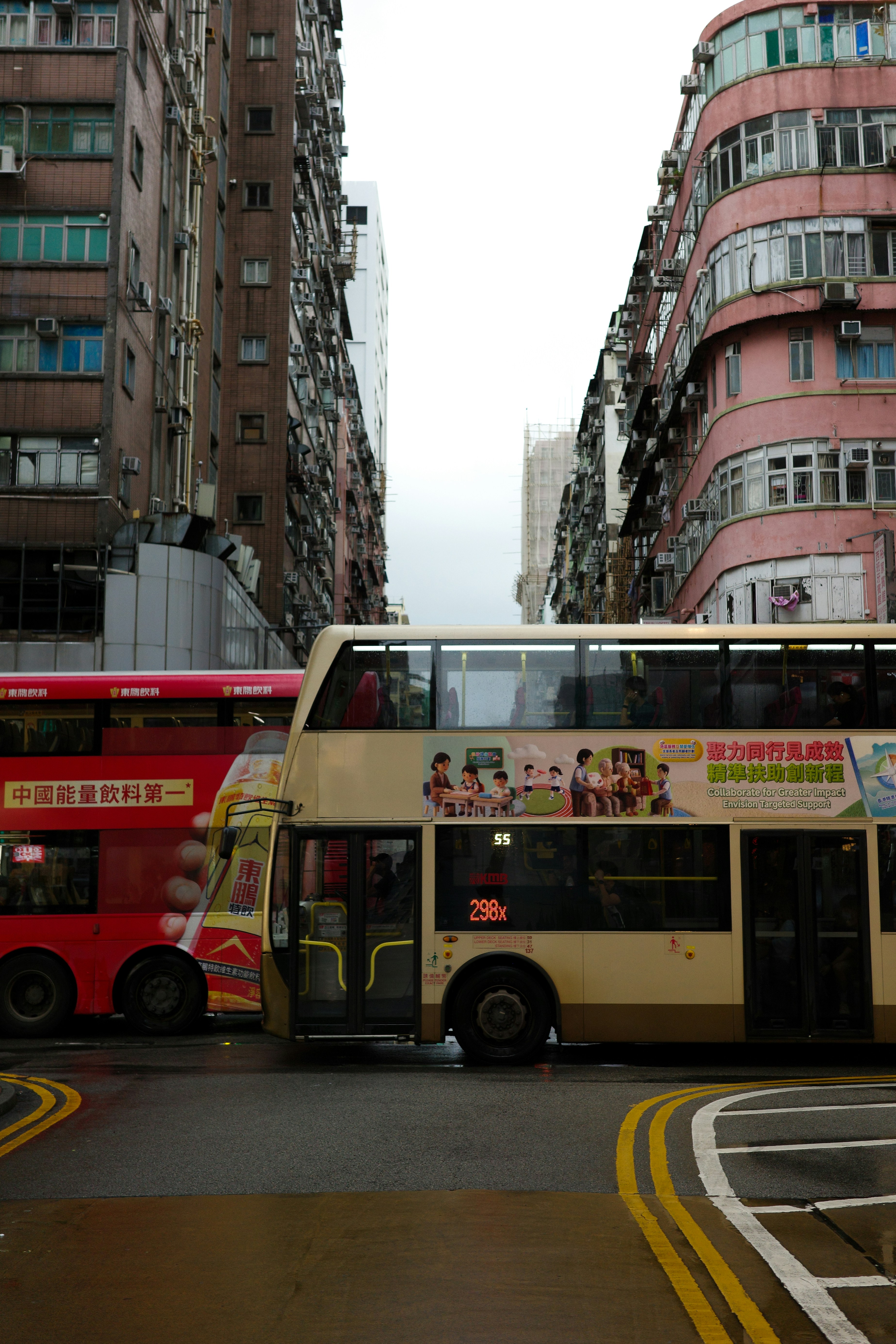 City Bus Parade Between Towers