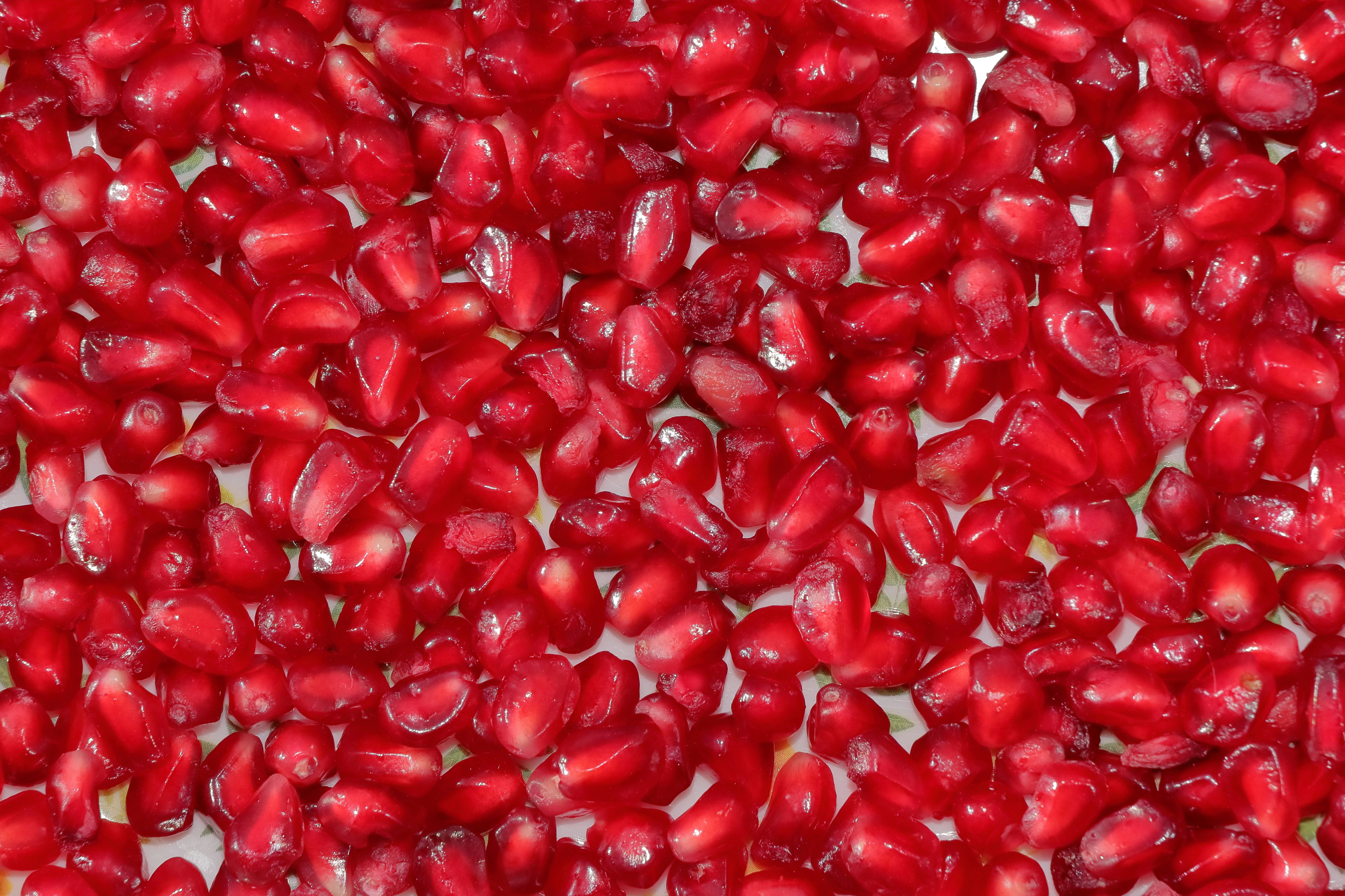 Crimson Pomegranate Seeds: A Lush Carpet of Ruby Facets