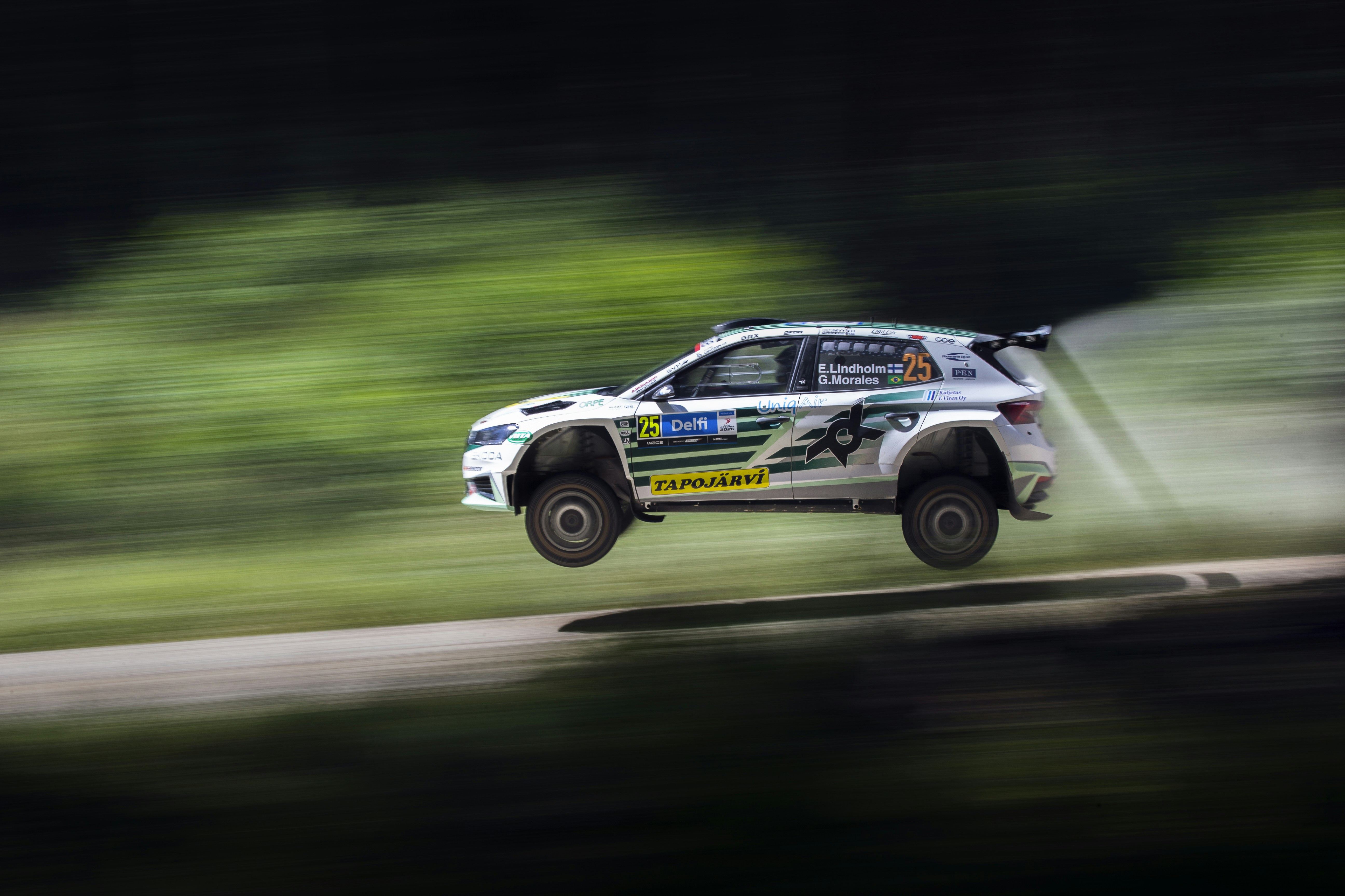 Speedline of Steel: Rally Car in a Bluestreak Blur
