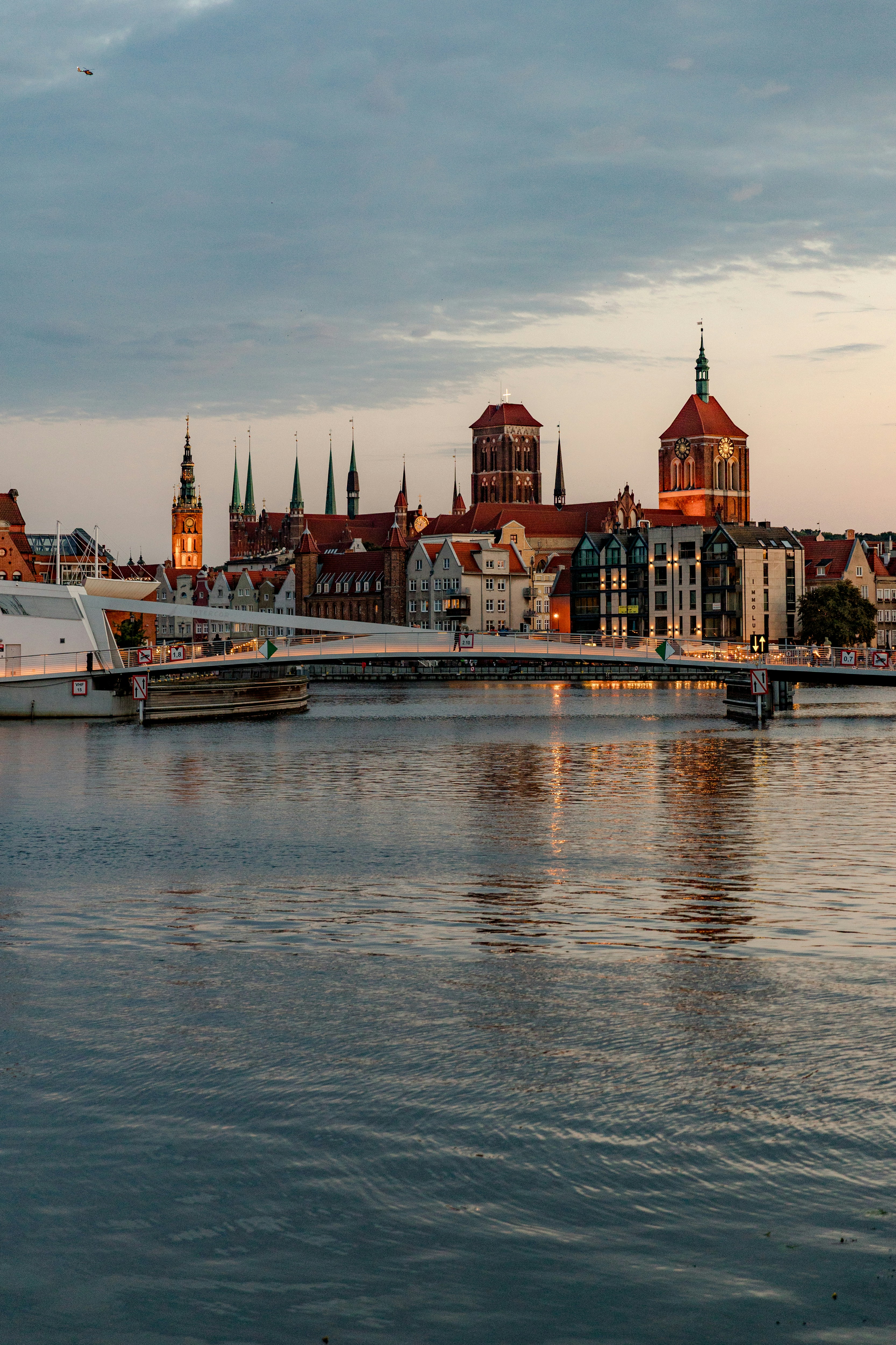 Riverside Clock Towers: Evening Glow Over a Historic Hafen City