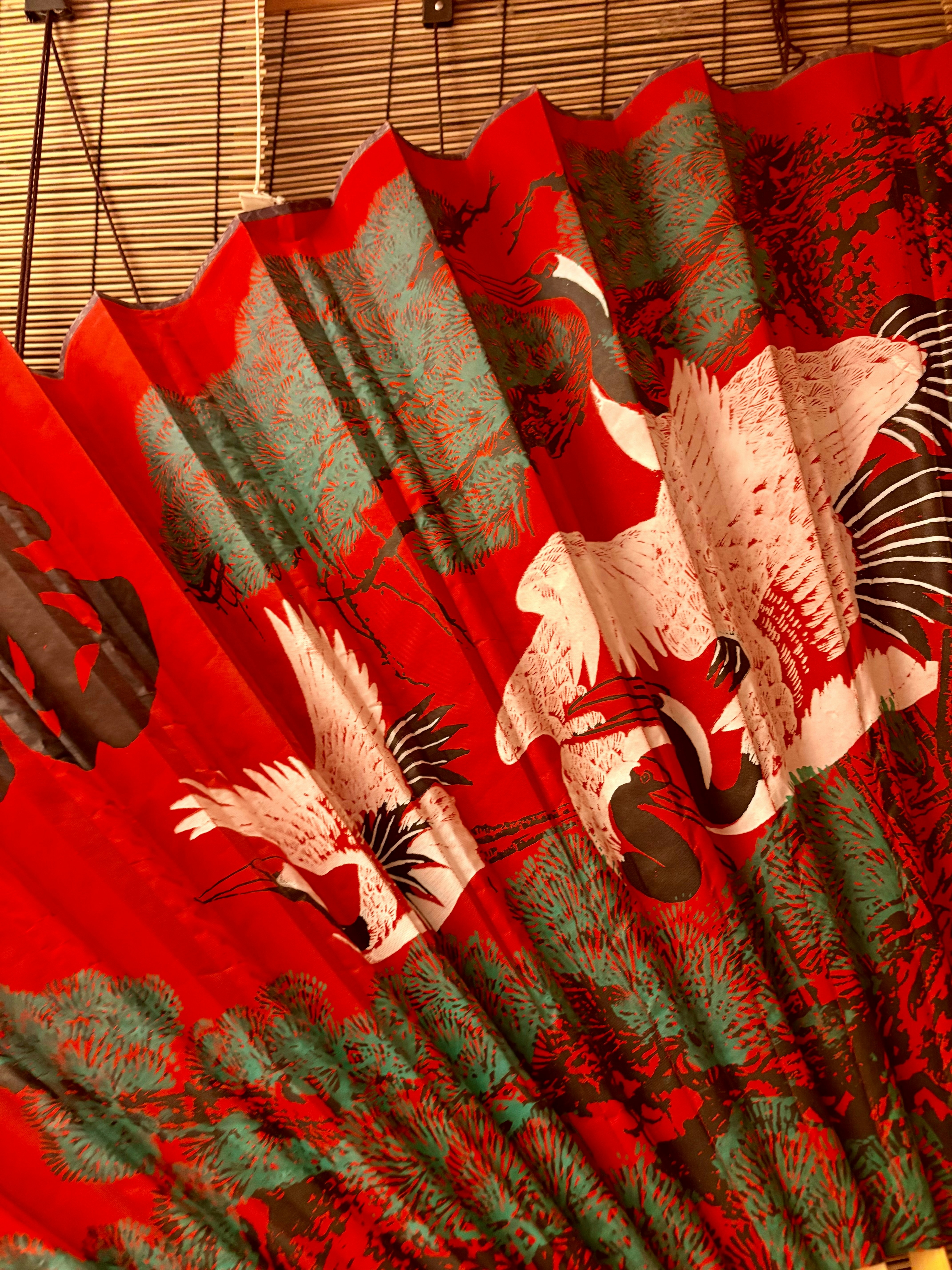 Crimson Crane on a Folded Silk Scene