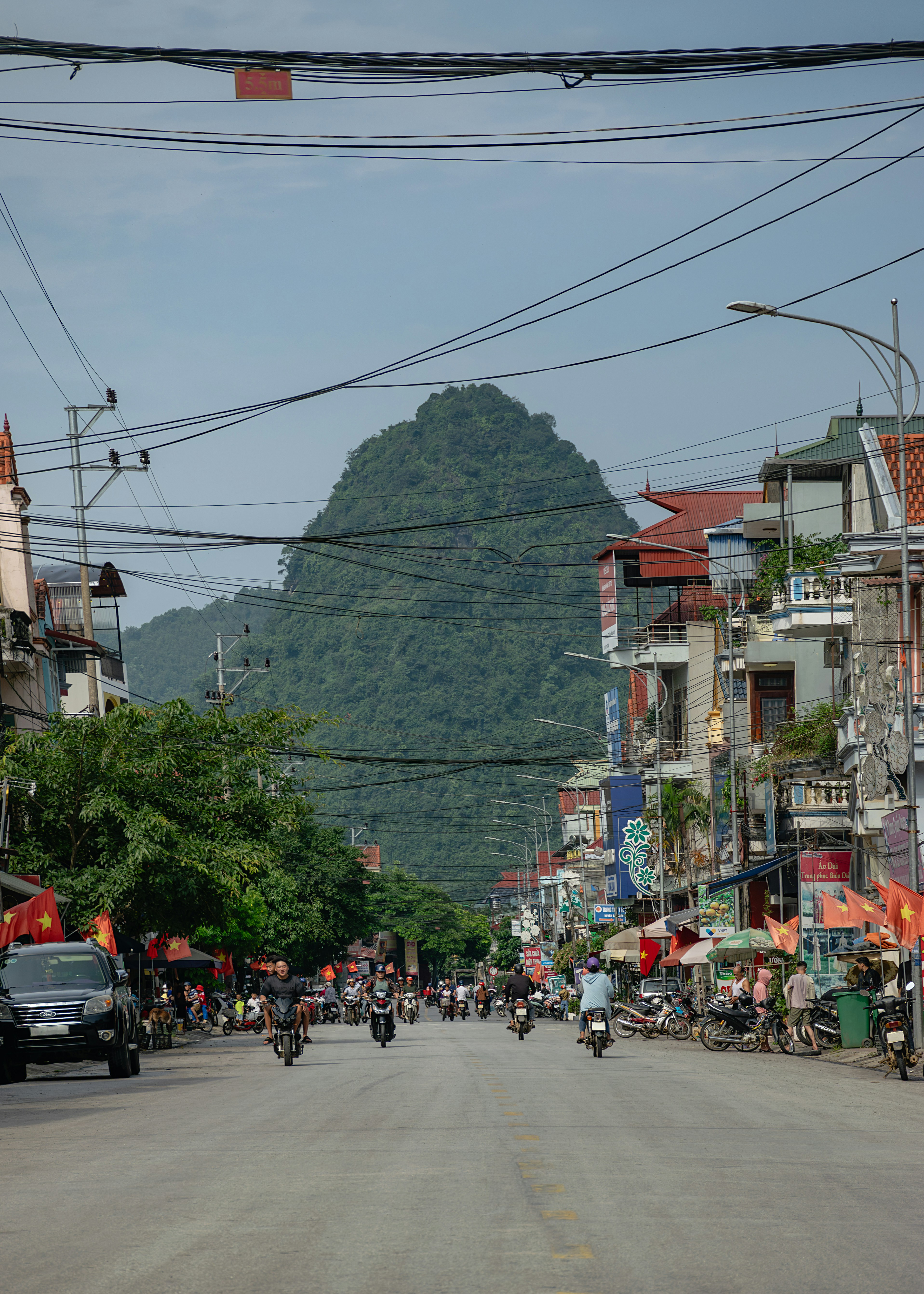 Street Scene Framing Toward the Green Monolith