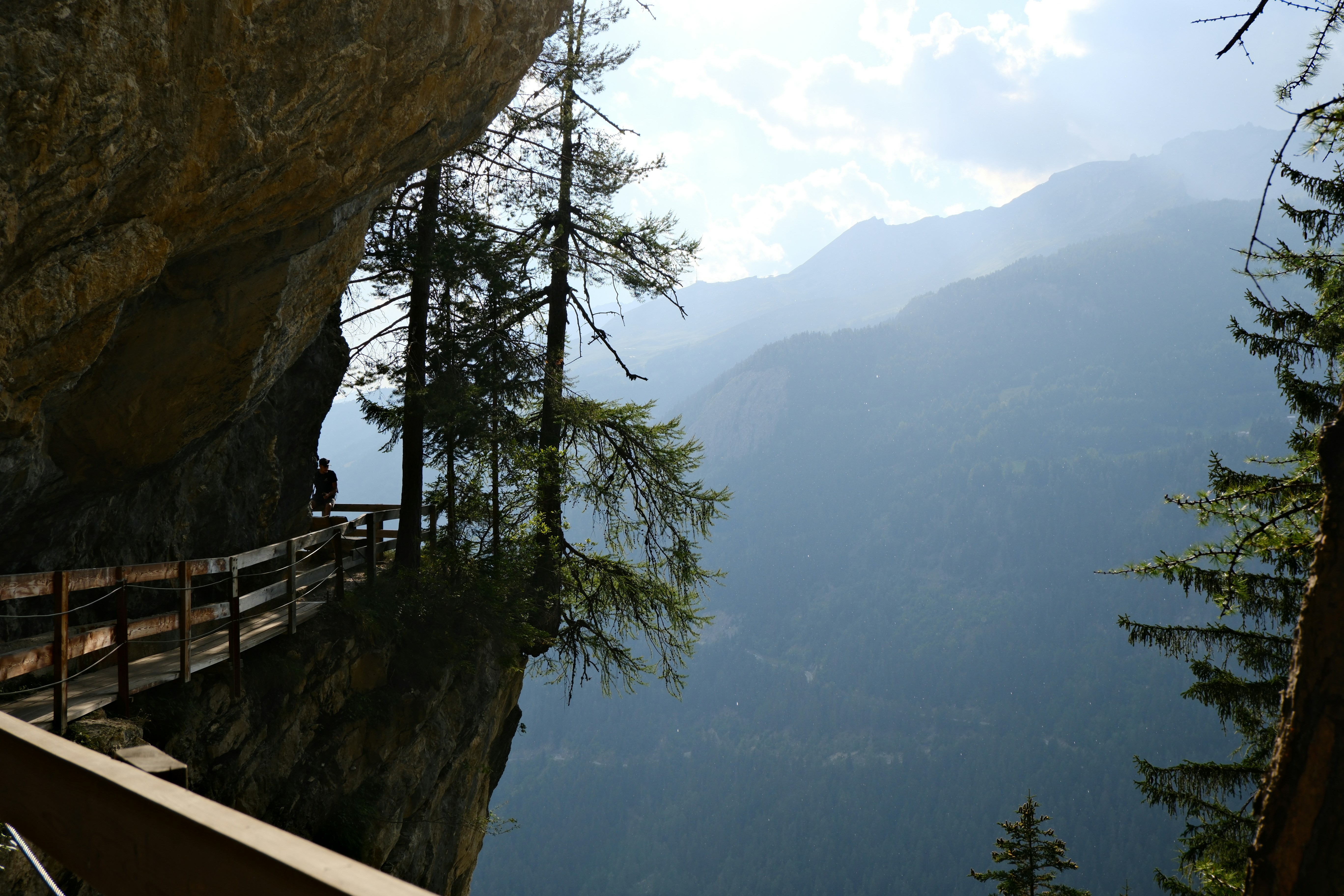 Cliffside Path Framing a Mountain Vista