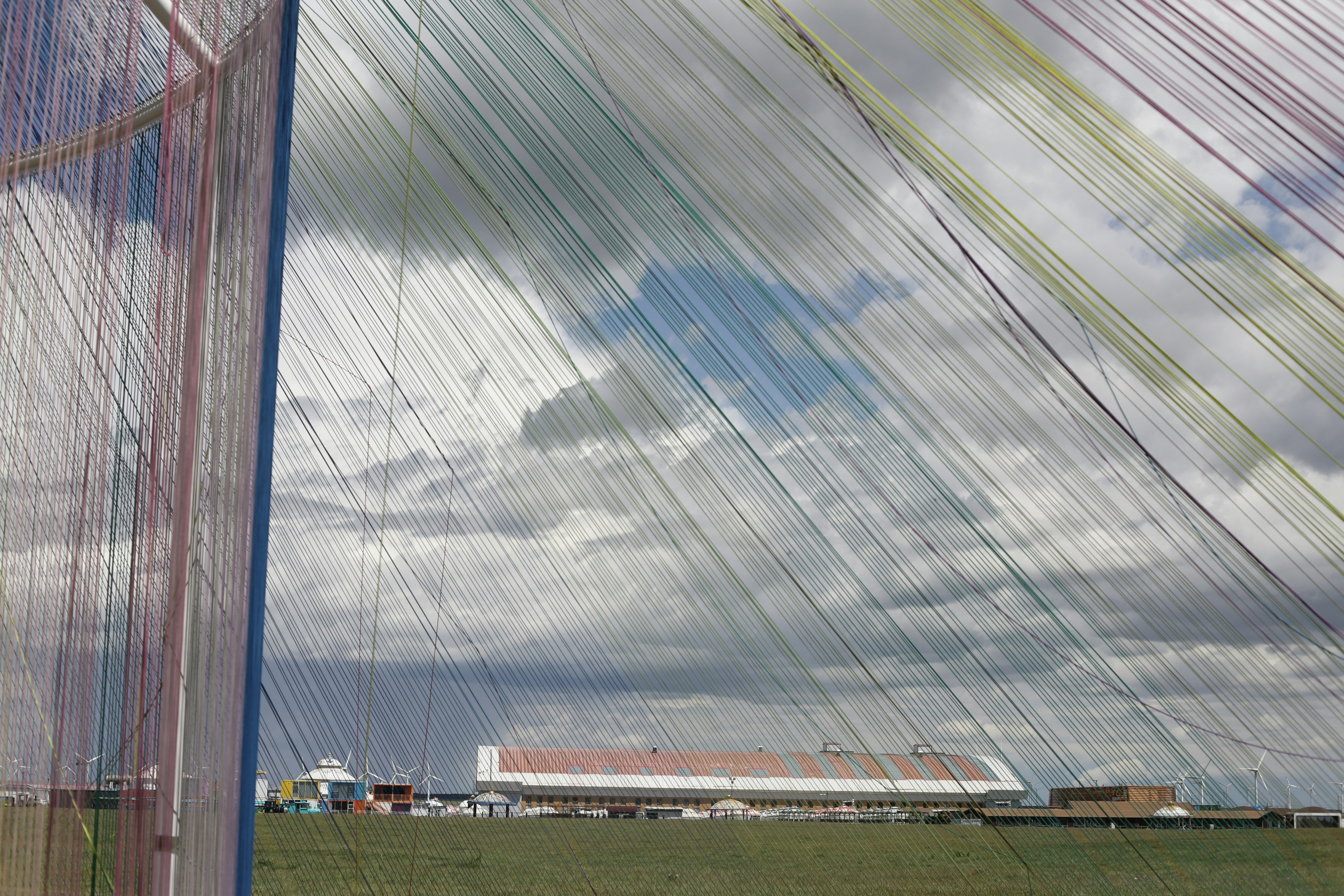 Stringscape: A Windy Field of Colorful Tethers and Sky
