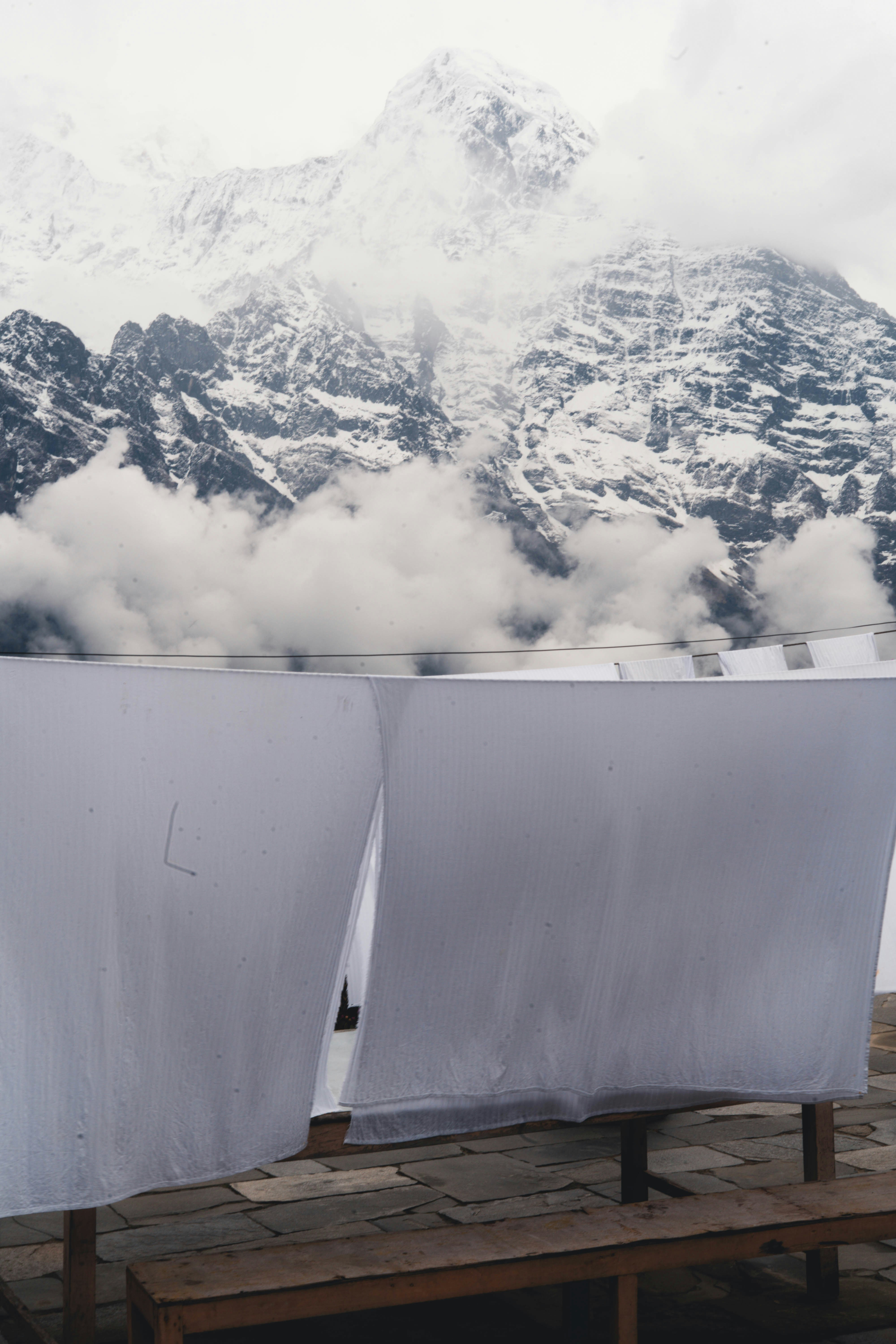 White Vapor Over Panels: Mountain Summit Backdrop