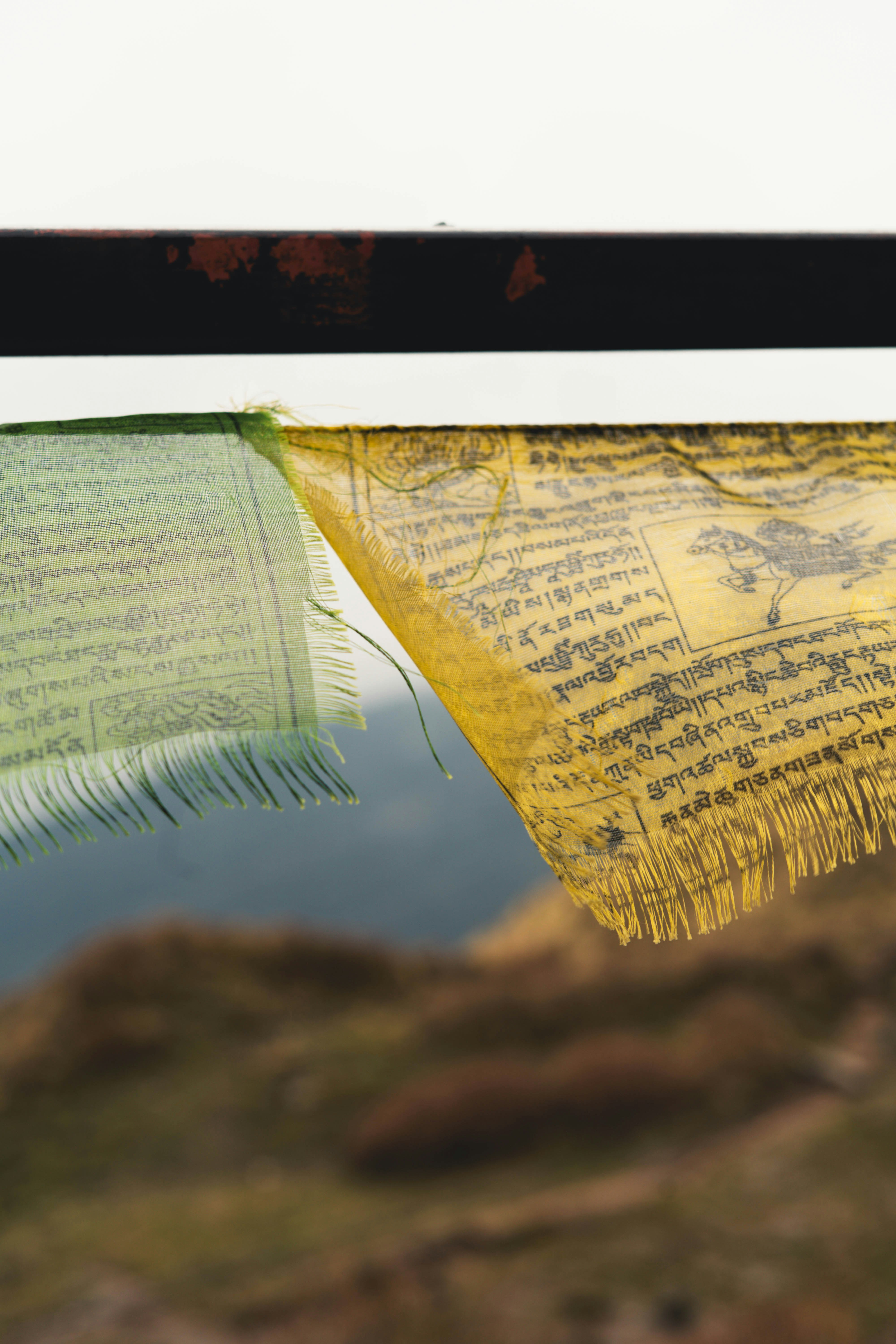 Prayer Flags Rippling Above a Wind-Swept Moor