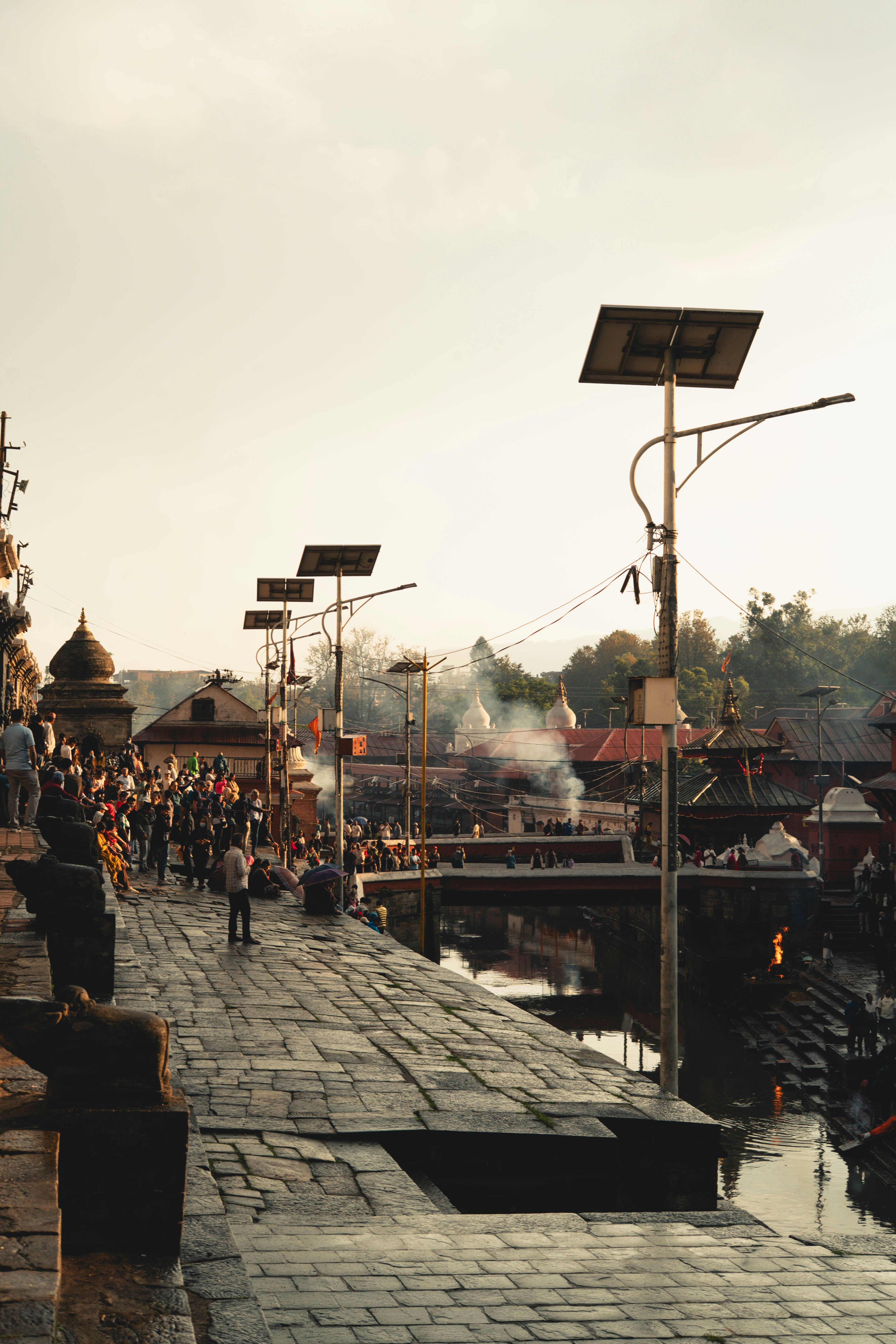 Flux of the Riverside Bazaar at Dusk