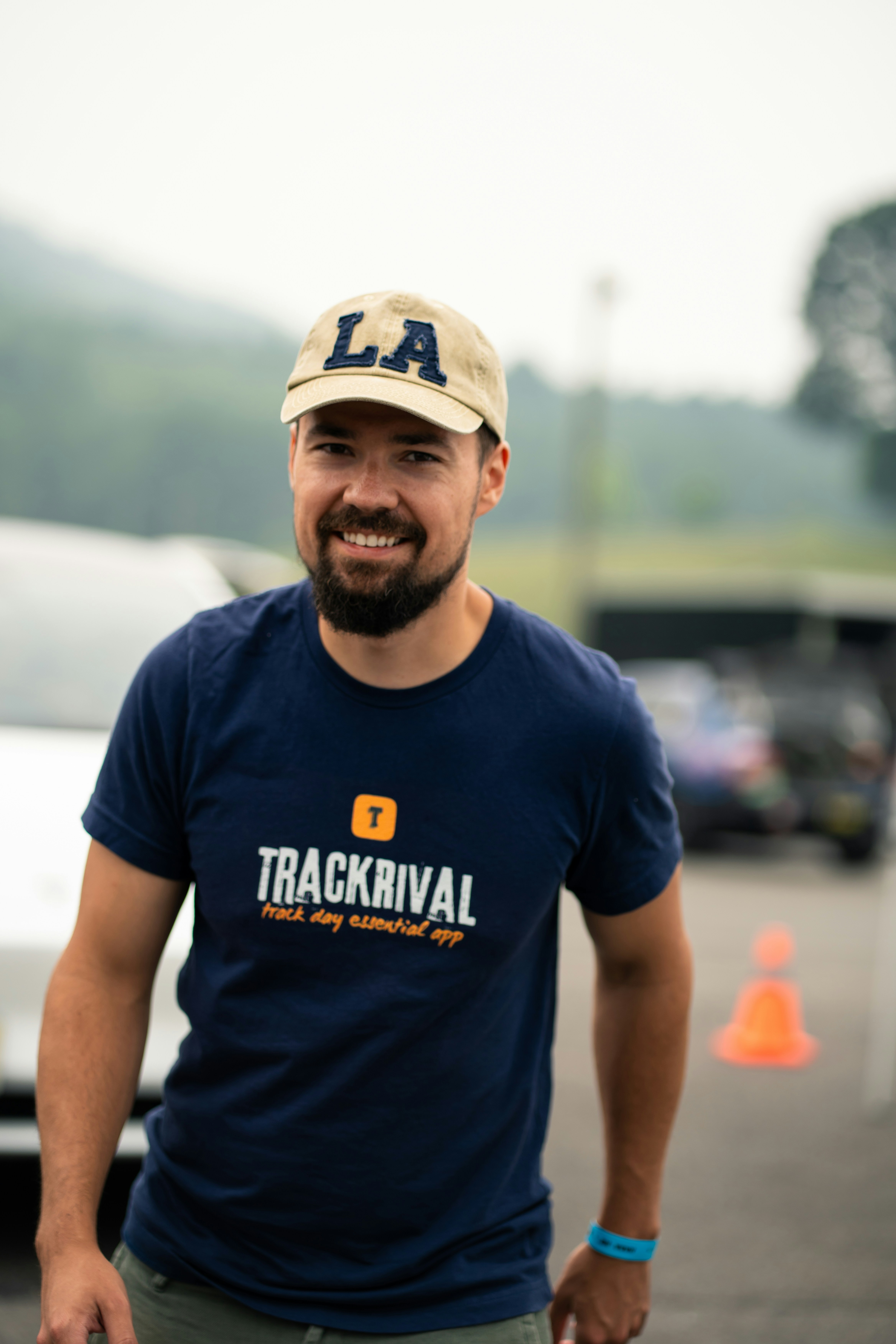 Runner in navy Tee at Trackival Event, LA Hat, Seaside Blur