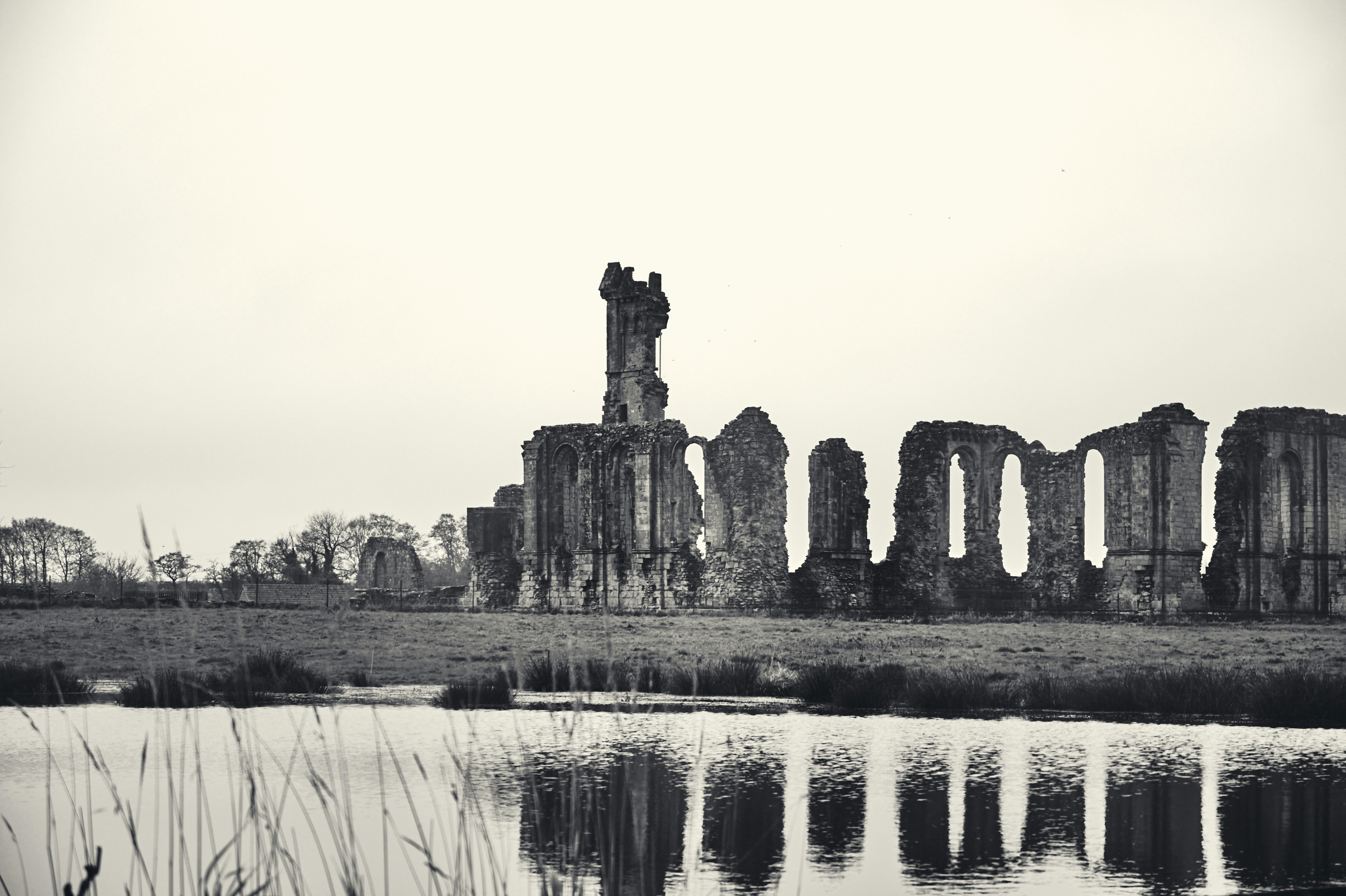 Ruins at the Edge: Monochrome Echoes by the Water
