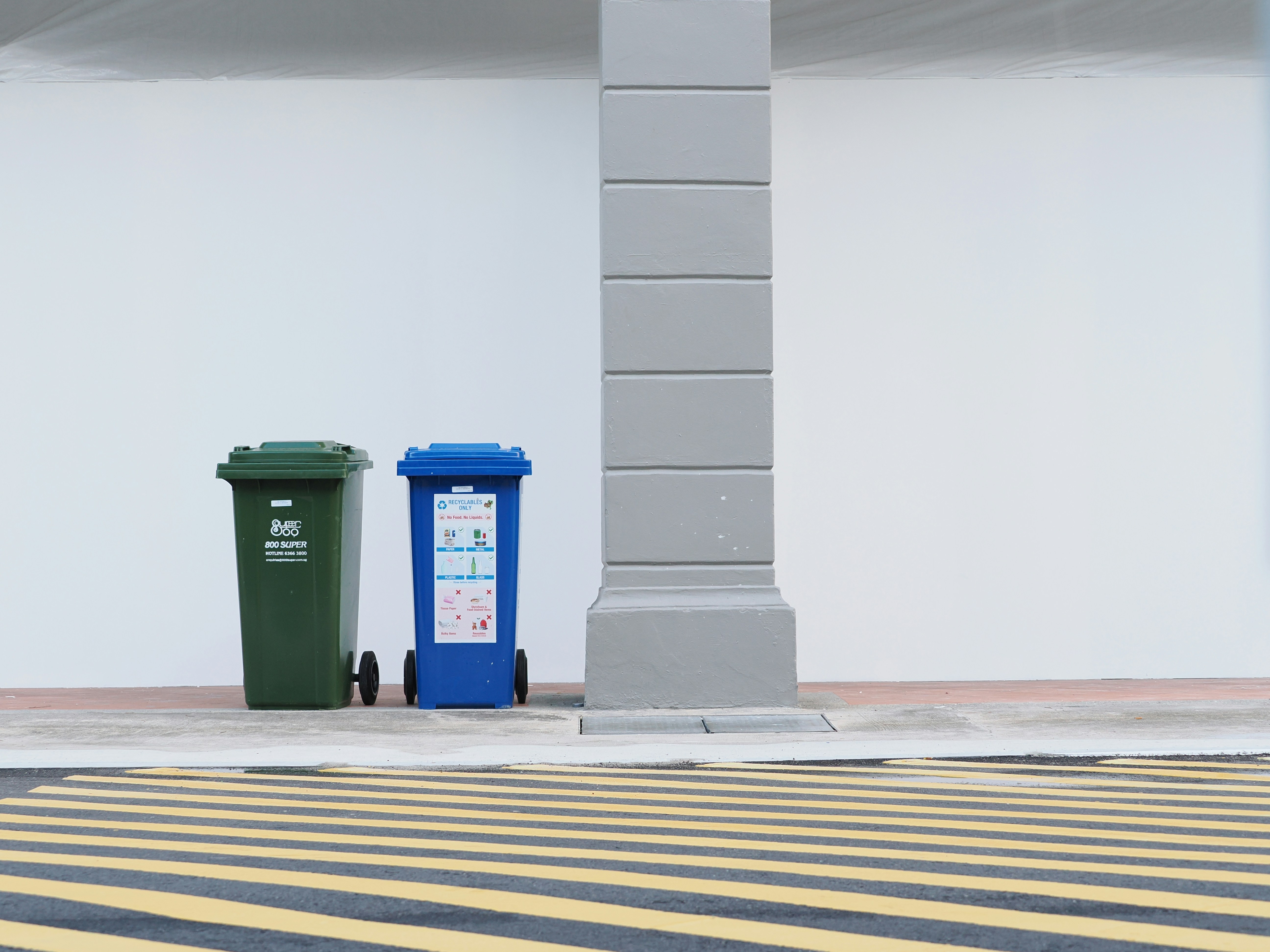 Trash Bins by a Column: Quiet Urban Threshold