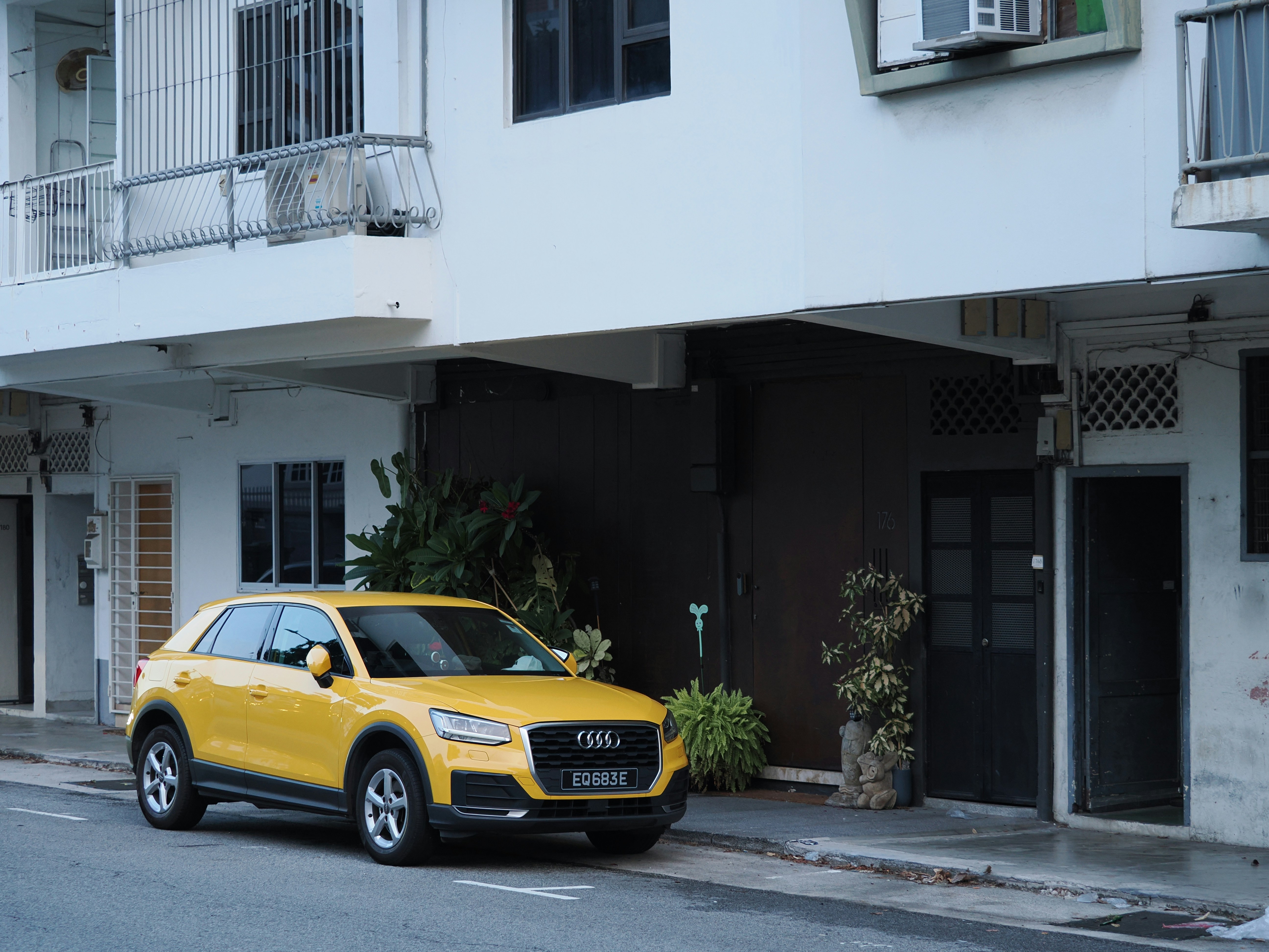 Yellow Audi in a Quiet Urban Studio