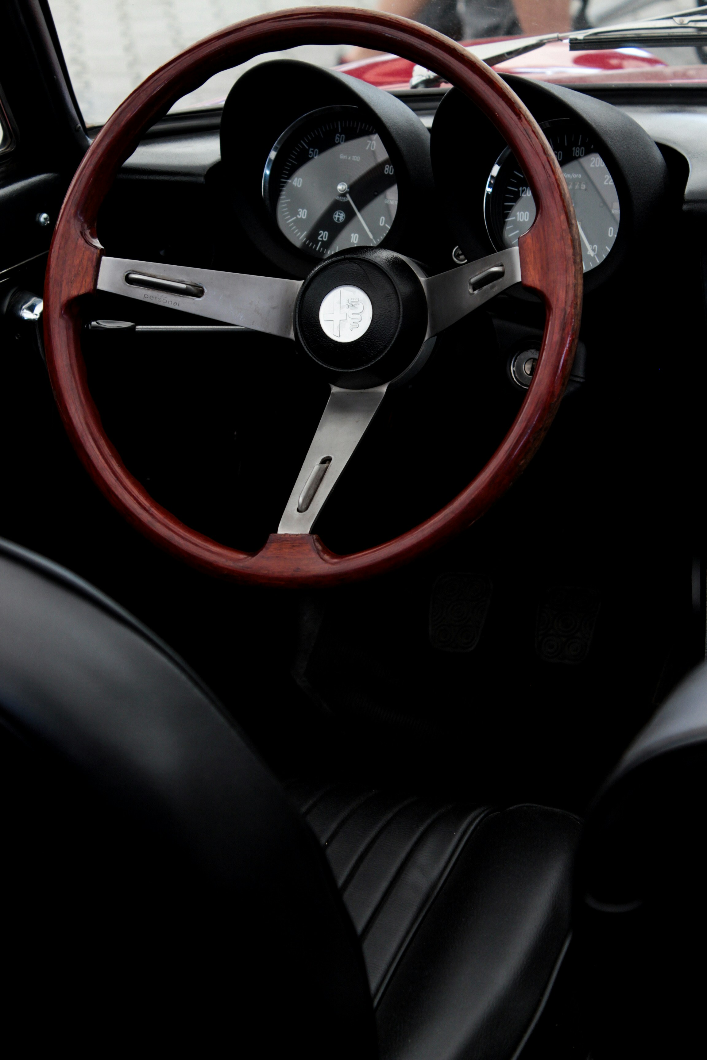 Vintage Steering: A Classic Car’s Wooden Wheel and Dials