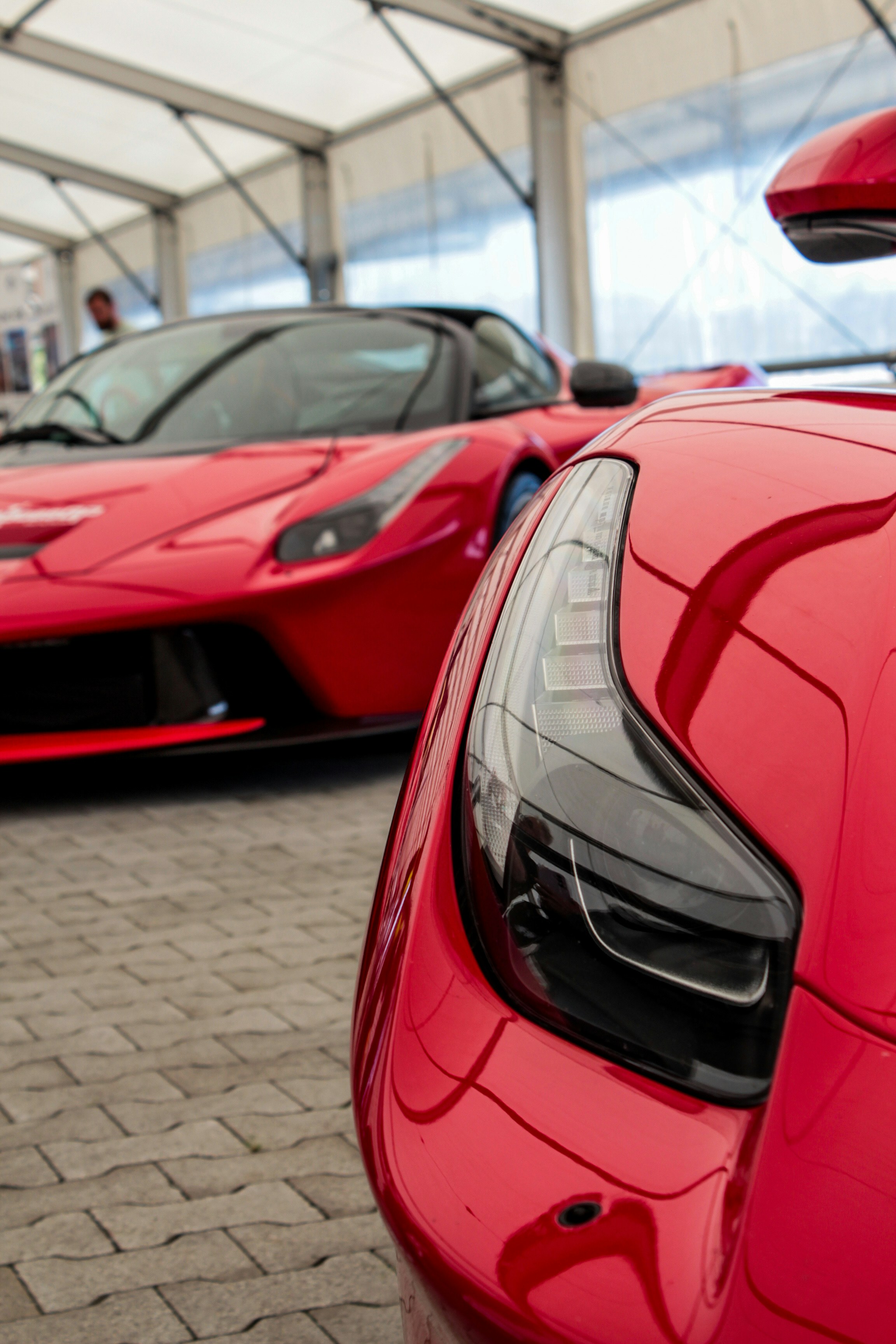 Red Precision: Front Closer Look at a Sport Car Row