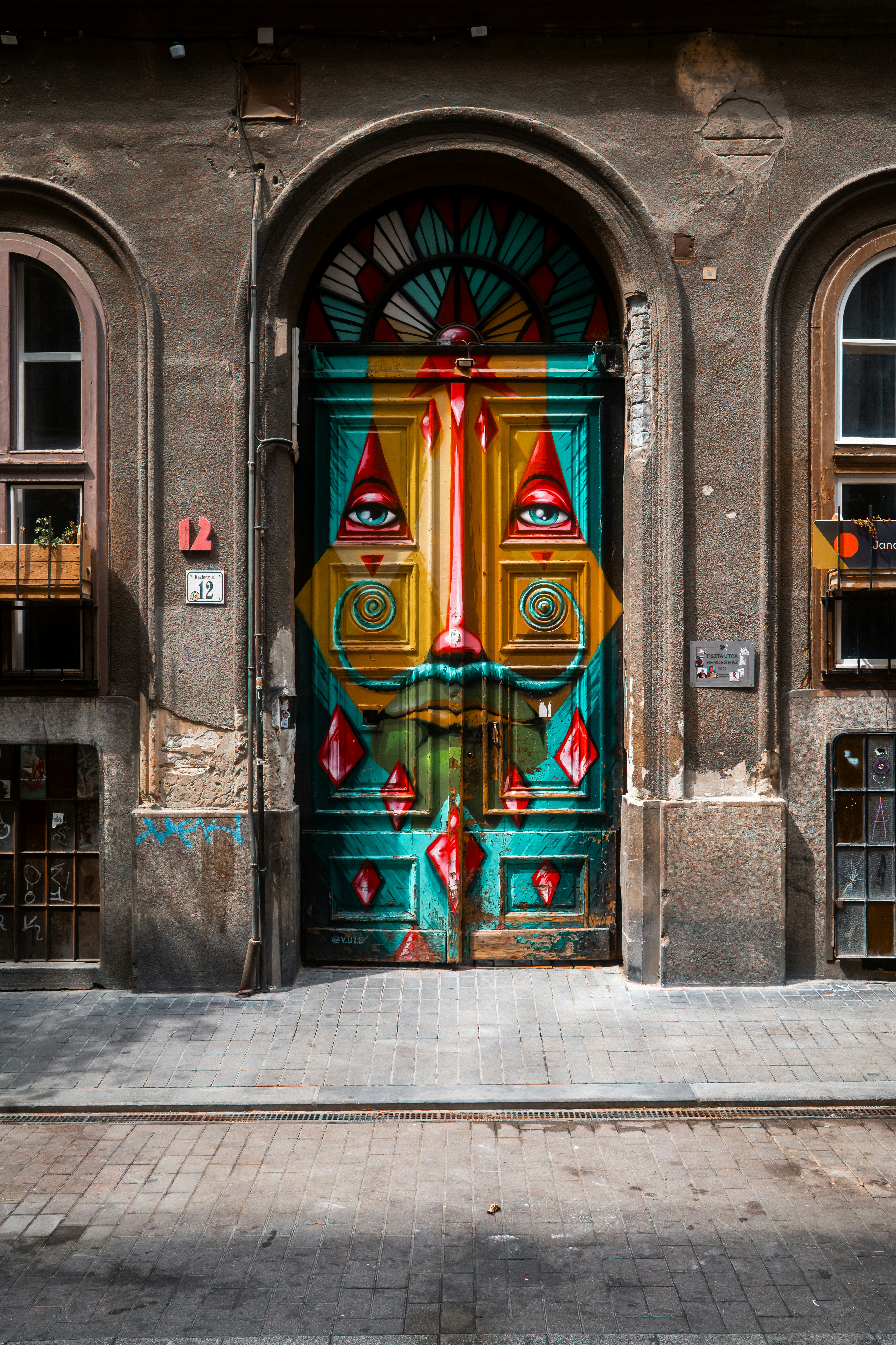 Portal of Color: The Face of Street Art on an Aged Door