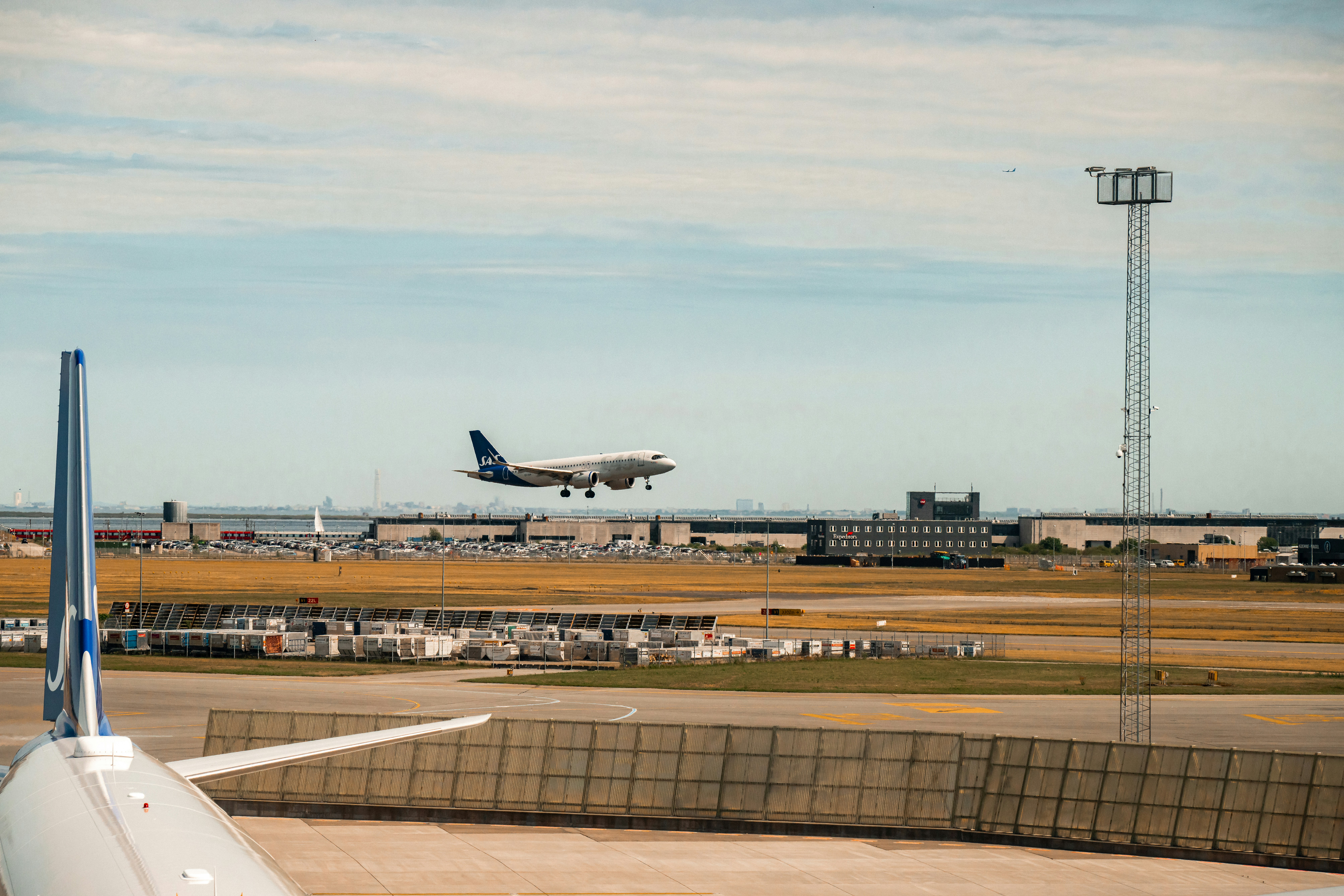 Landing Across the Tarmac: A Quiet Crossing at Dawn