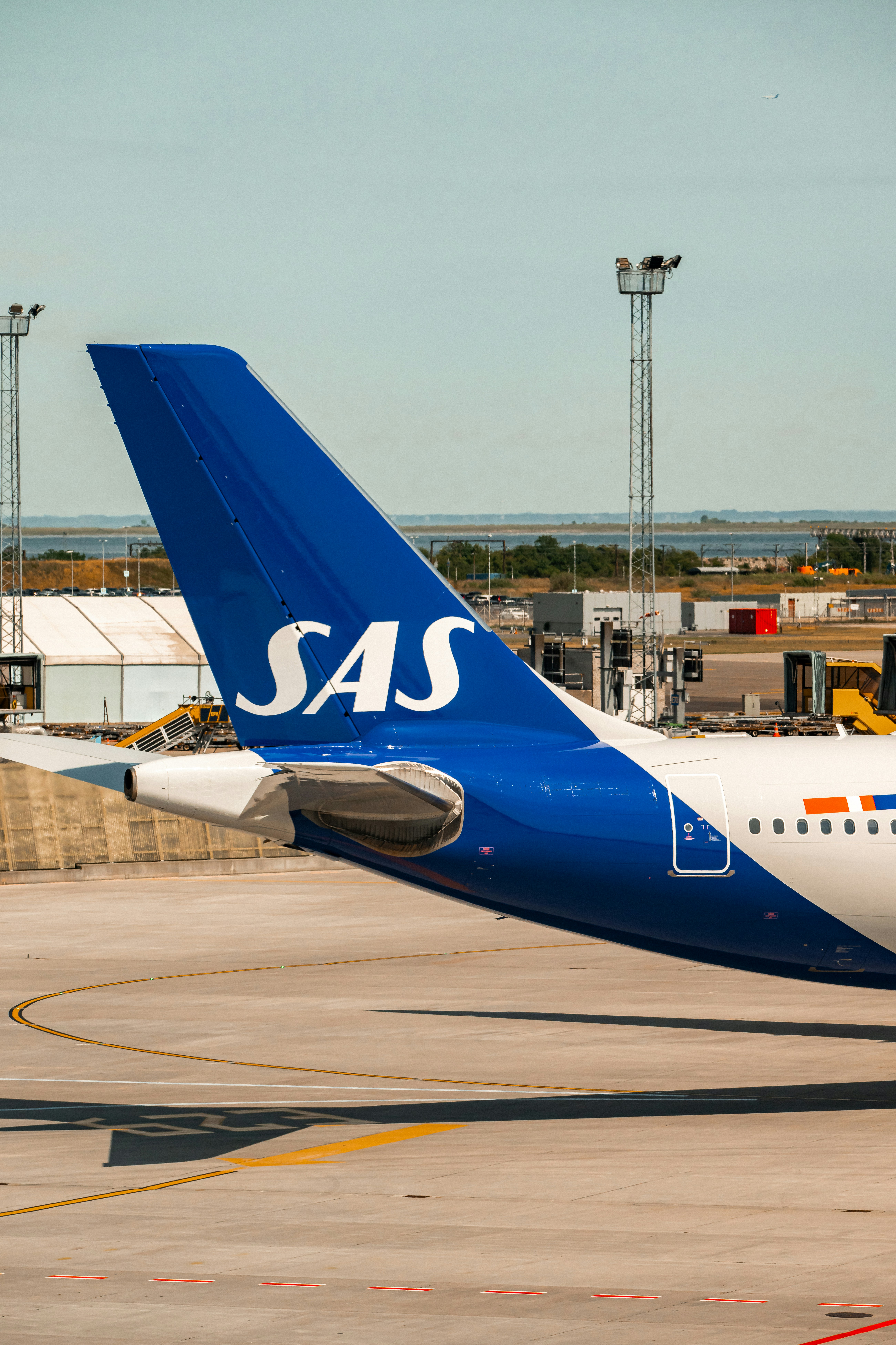 SAS Tail Against the Runway Horizon
