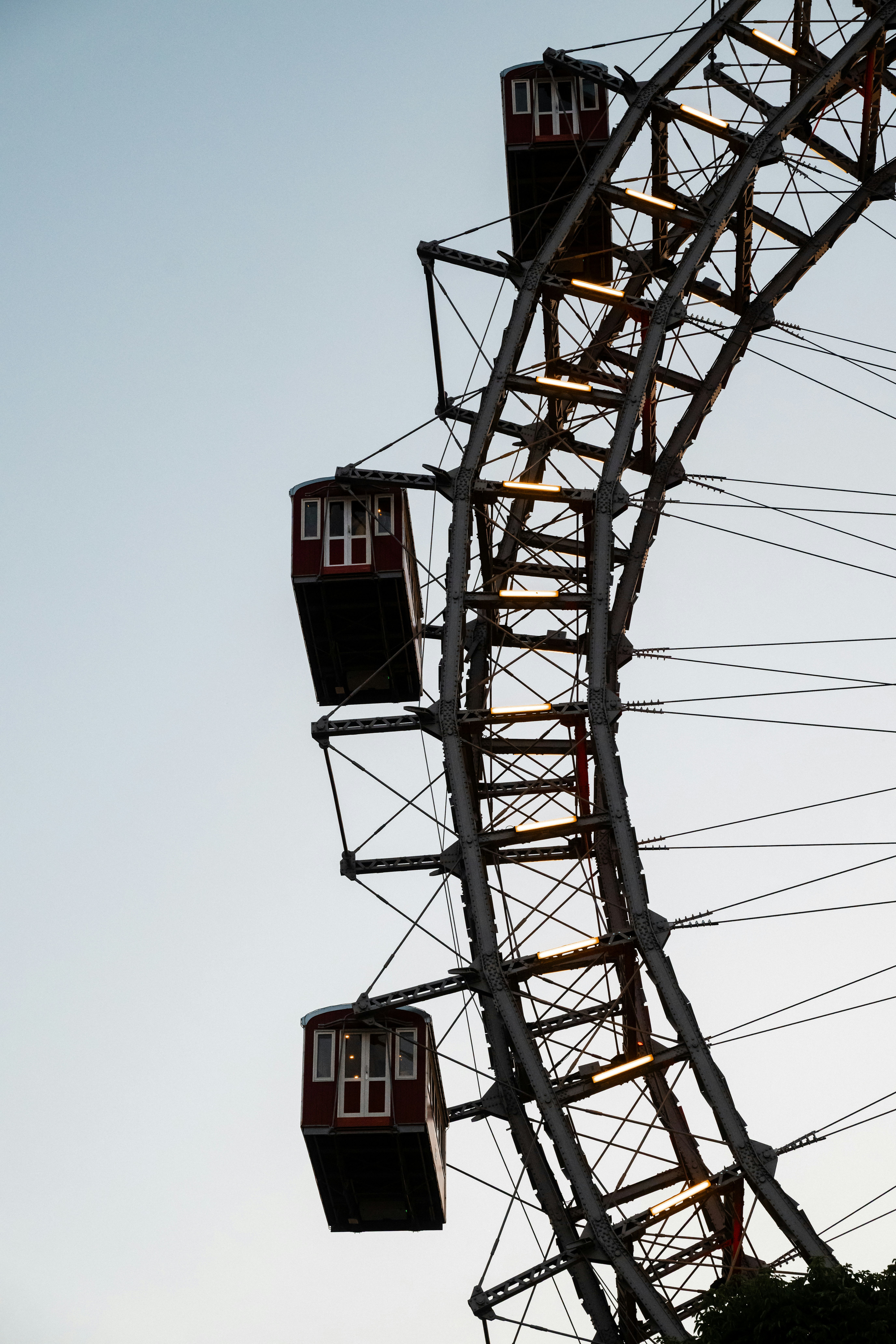 Suspended Moments: A Partial Ferris Wheel Quietly Graces the Sky