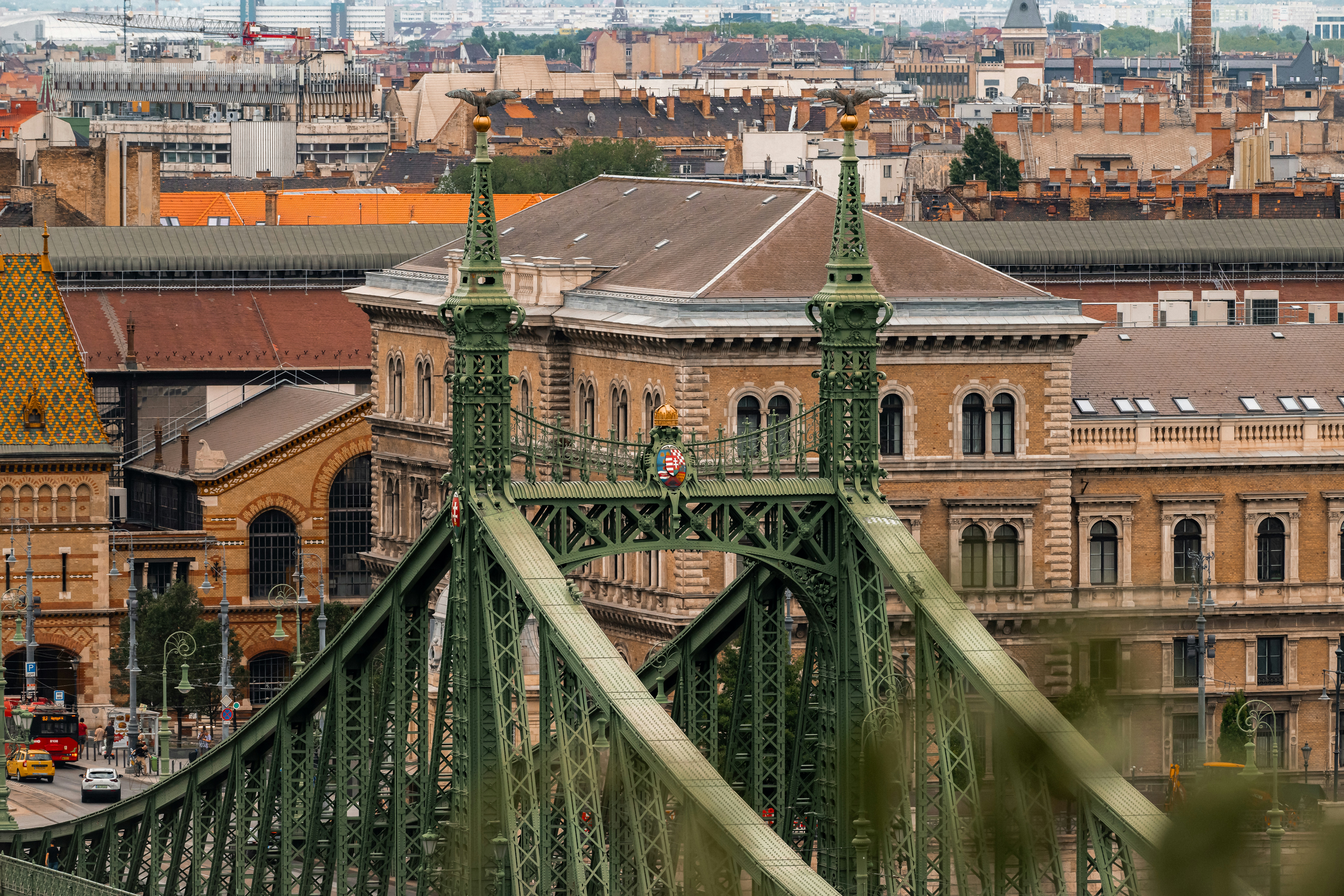 Cobblestone Choir: A City Bridge Framing the Historic Roofscape