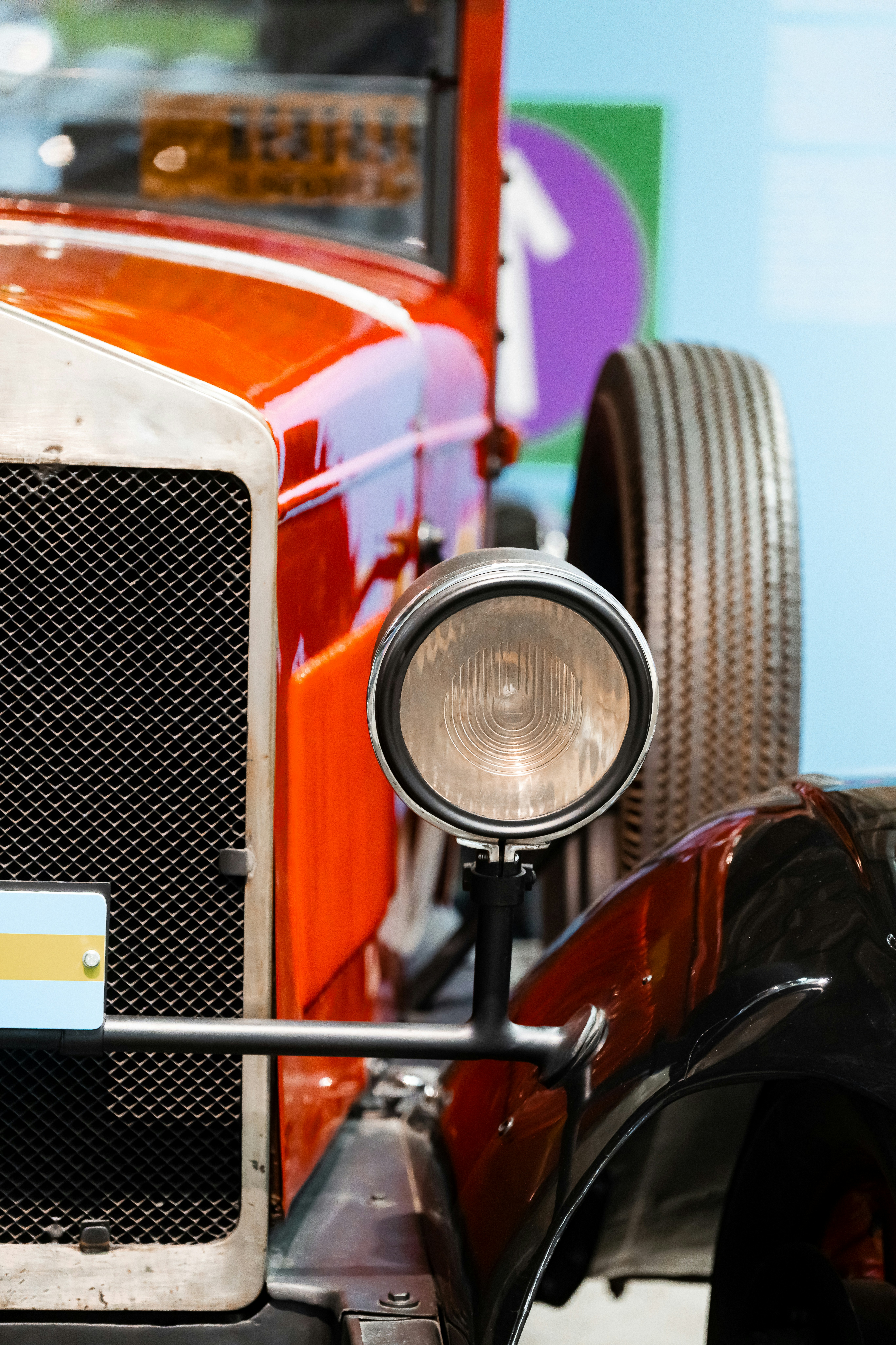 Bright Red Vintage Truck with a Centered Headlamp