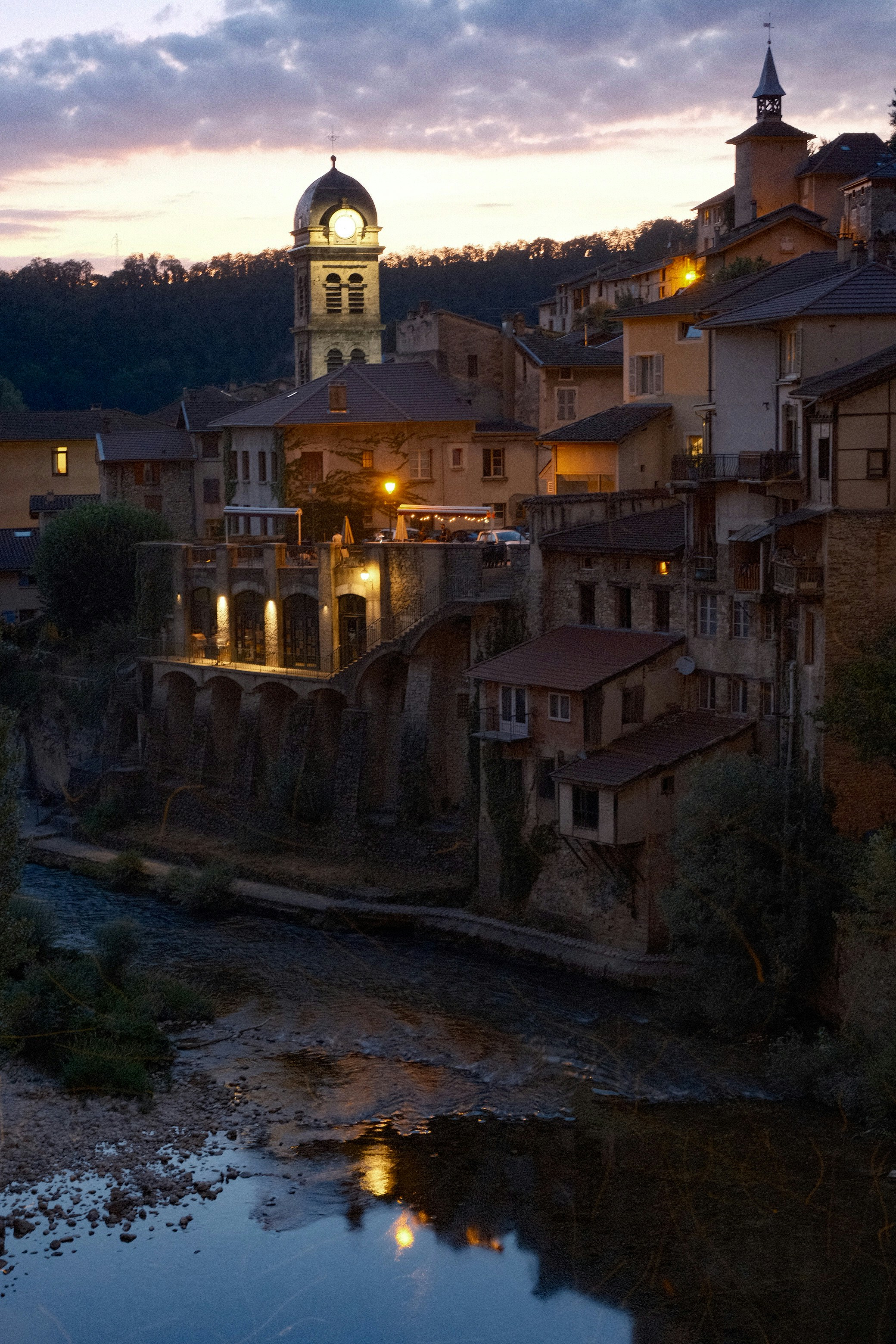 Twilight over the Stone Village: Clock Tower and Arcaded Bridge