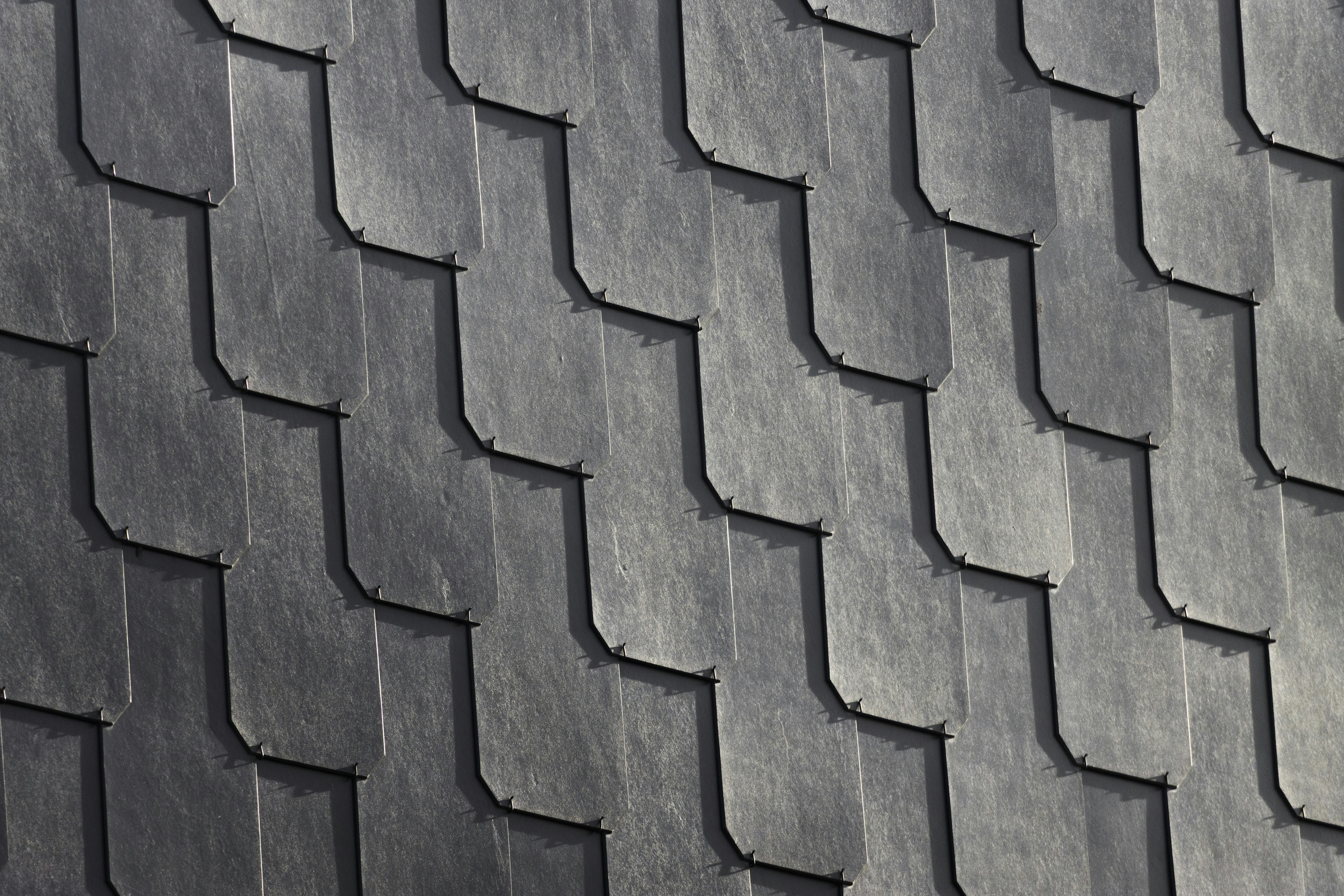 Geometric Rhythms: A Field of Slate Tiles in Gentle Light