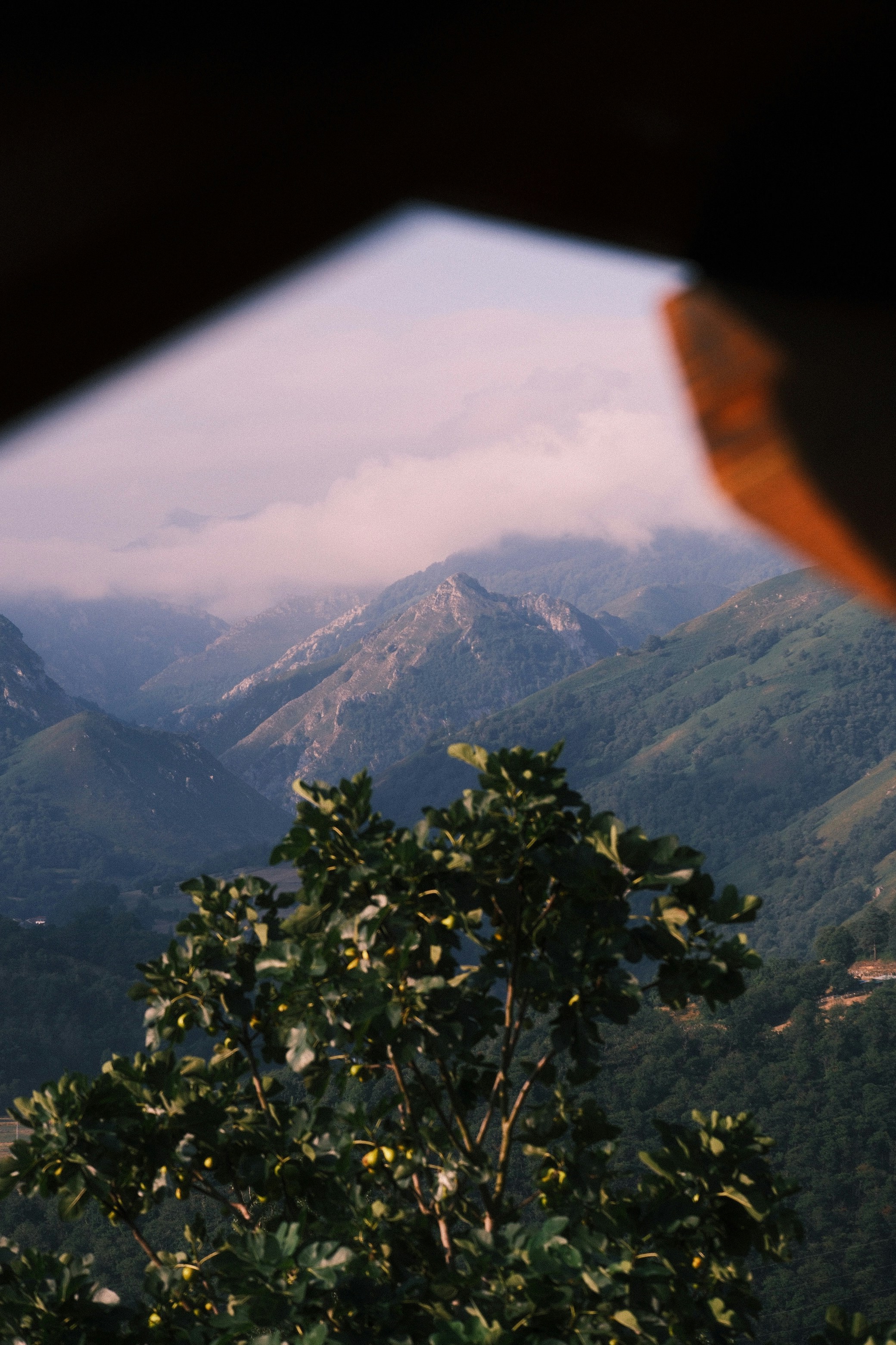 Mountain Vistas Framed by a Fluttering Roof Edge