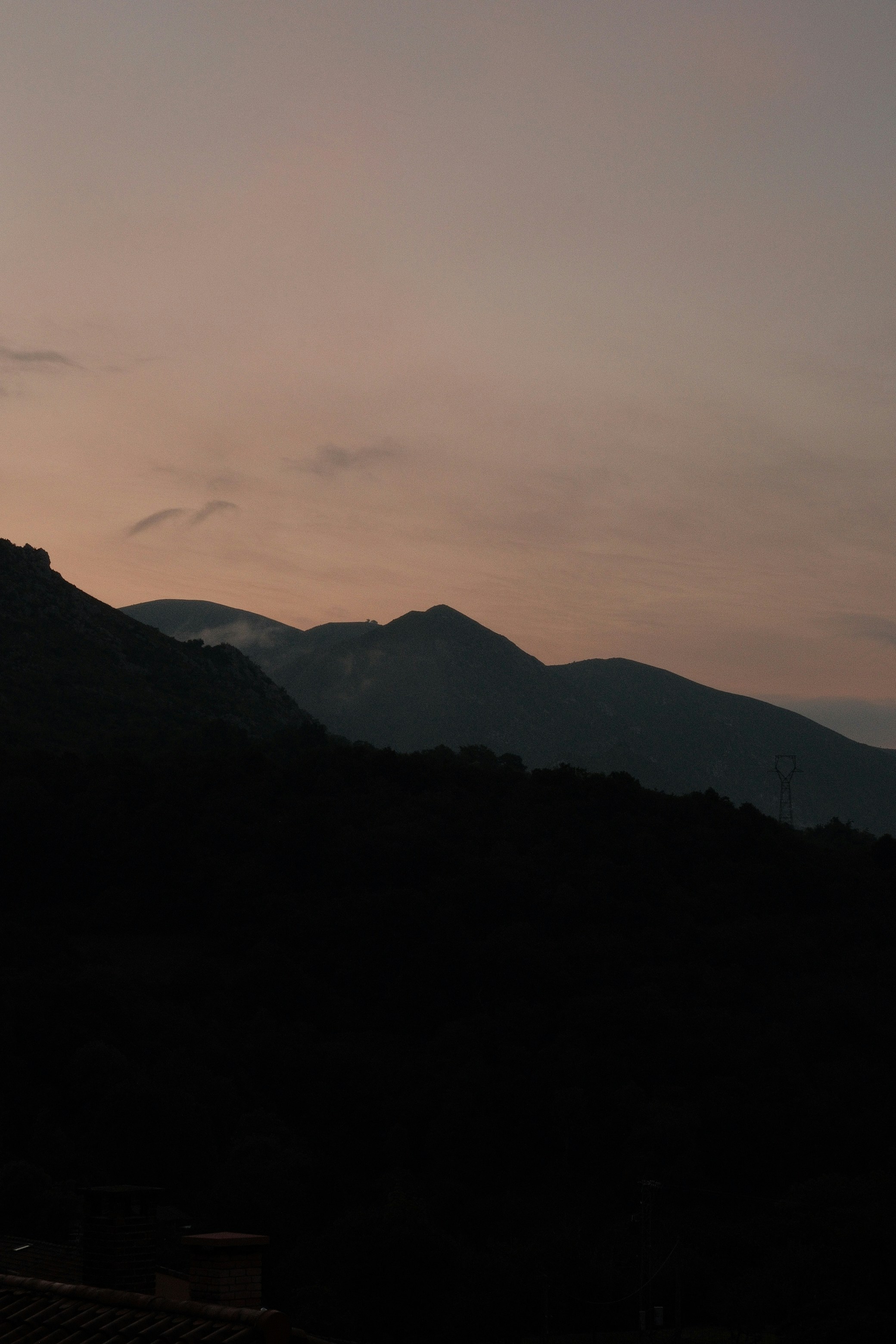 Twilight Silhouette Over Quiet Hills