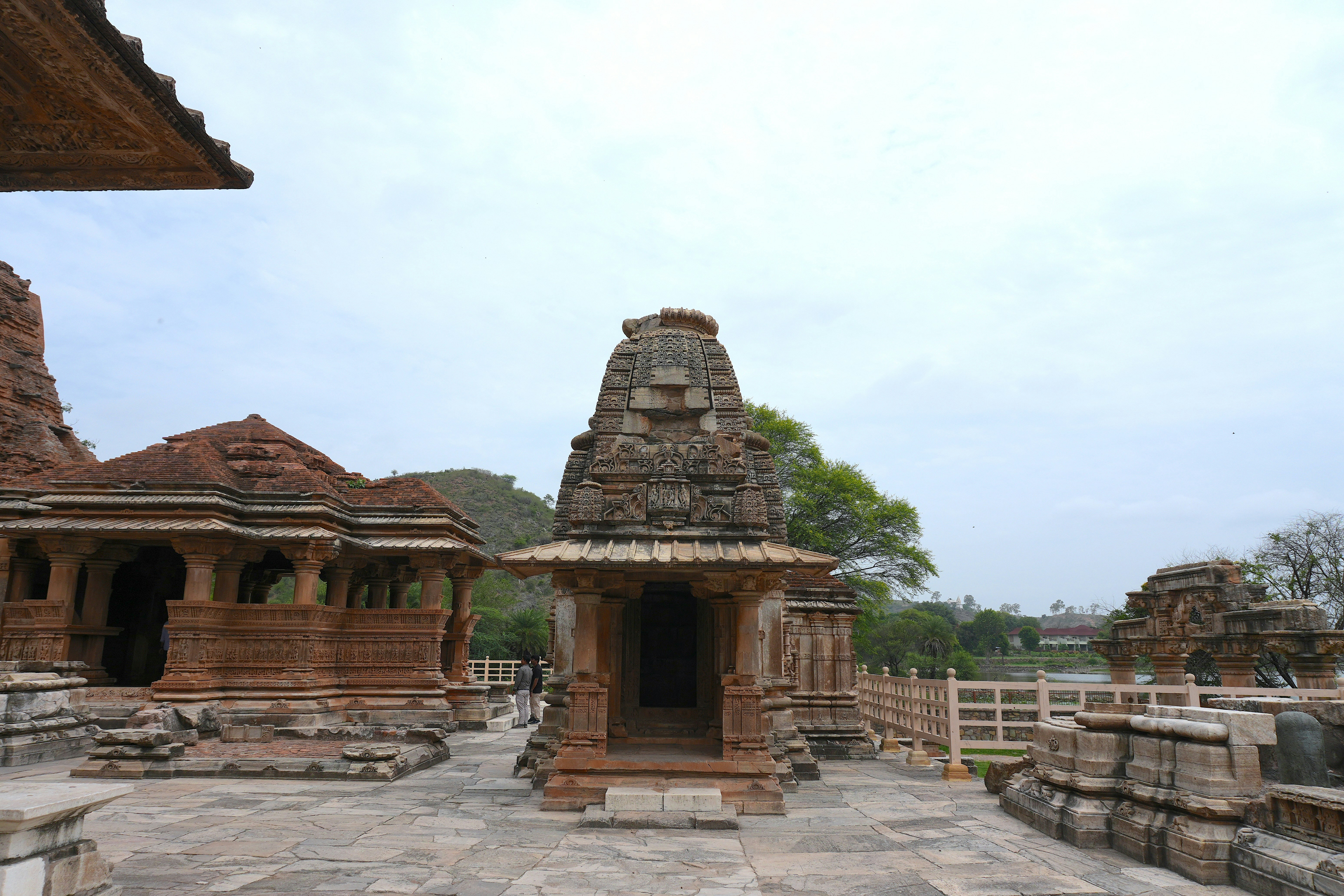 Ancient Temple Courtyard Framed by Weathered Sandstone Towers