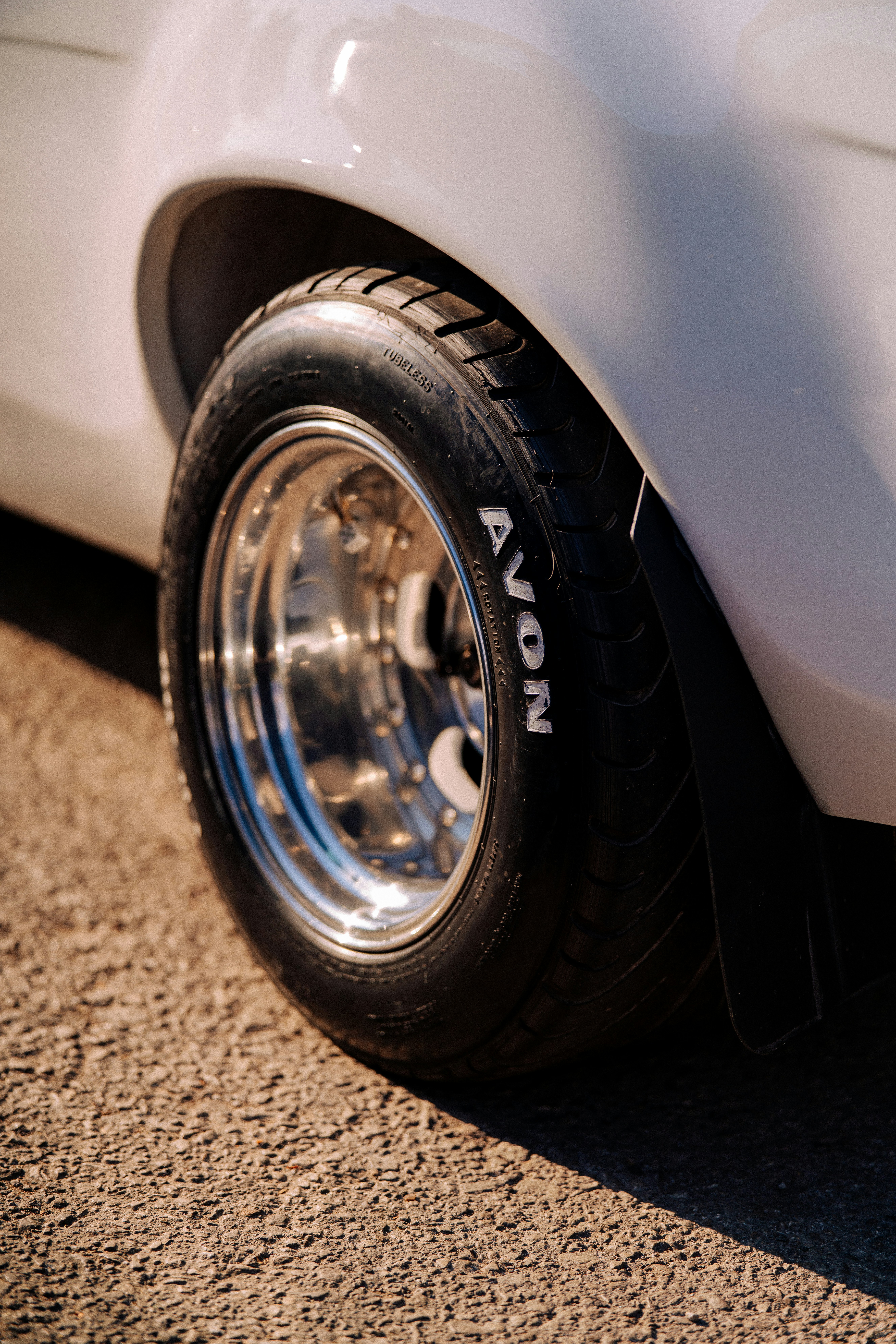 Chrome Wheel in Focus: a Classic Car's Quiet Stance
